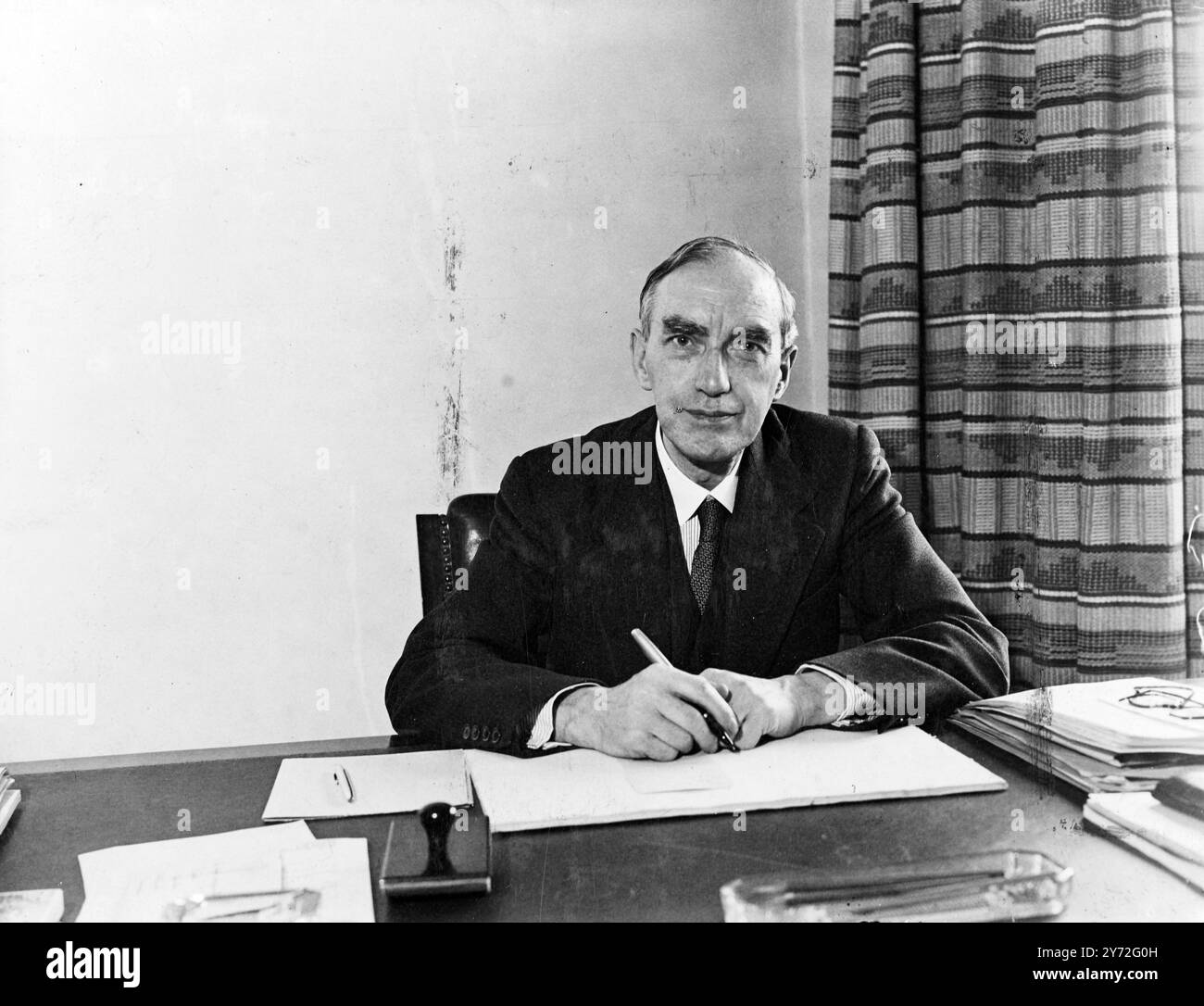 Sir Joseph Hallsworth, M.A., (pictured in his office at the National ...