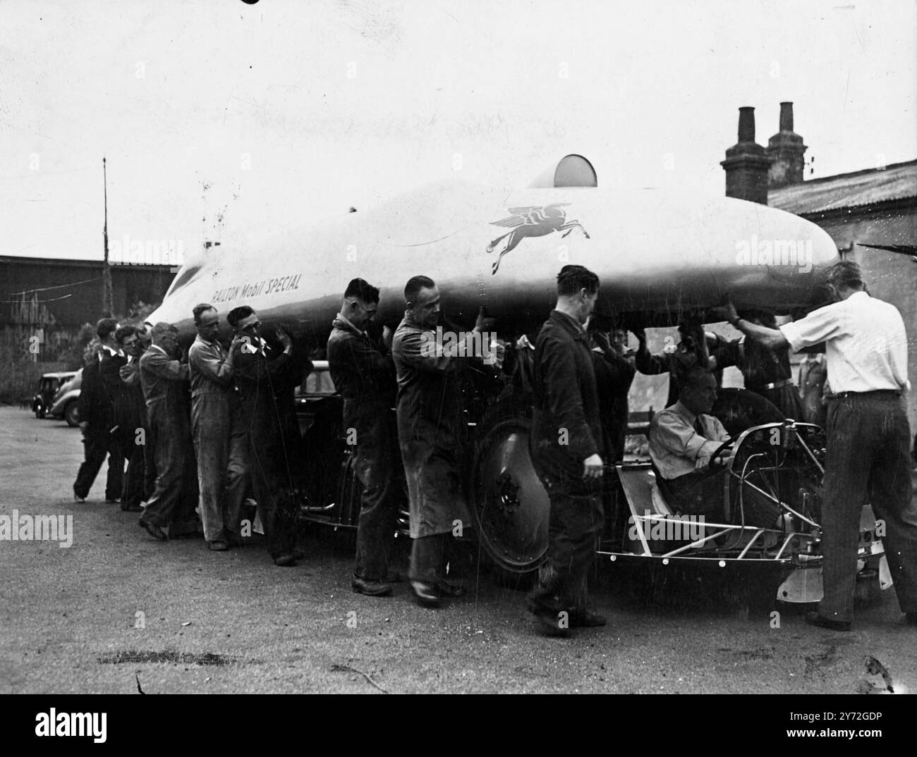 The streamlined body of the Railton Mobil Special is put on after John ...