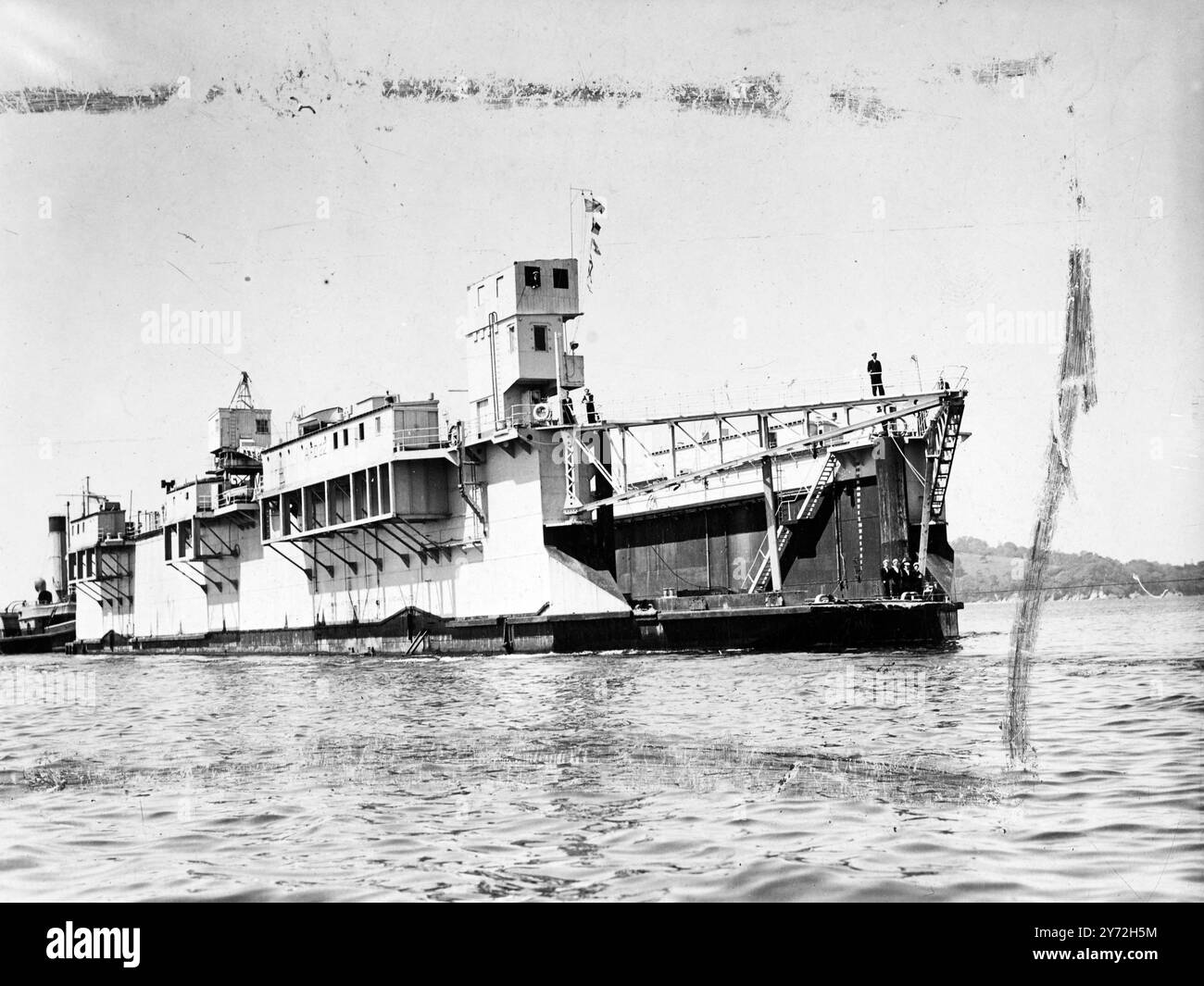 With the mooring of A.F.D. 22, one of four large floating docks, at ...