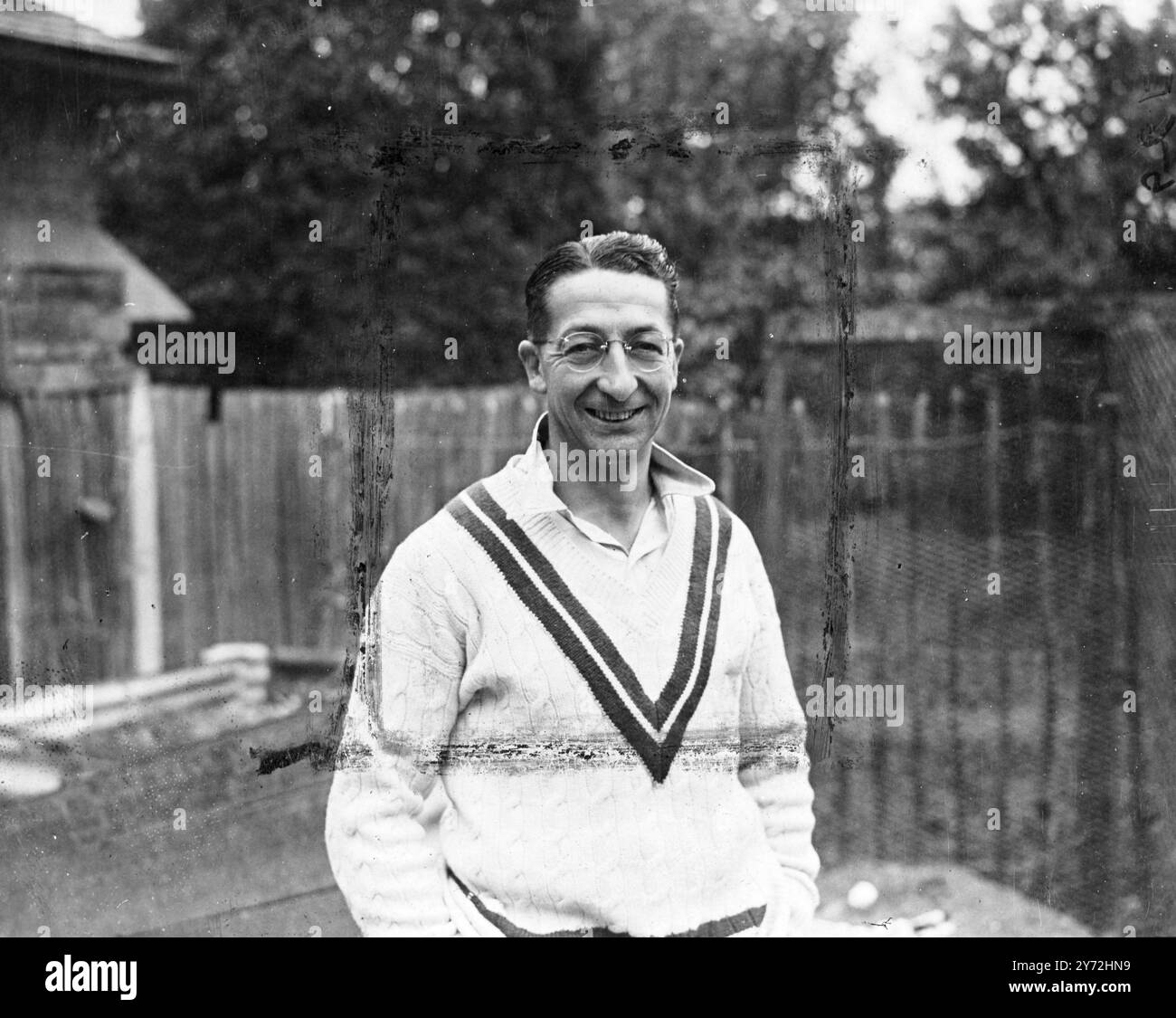 Cricket jersey bat Black and White Stock Photos & Images - Alamy