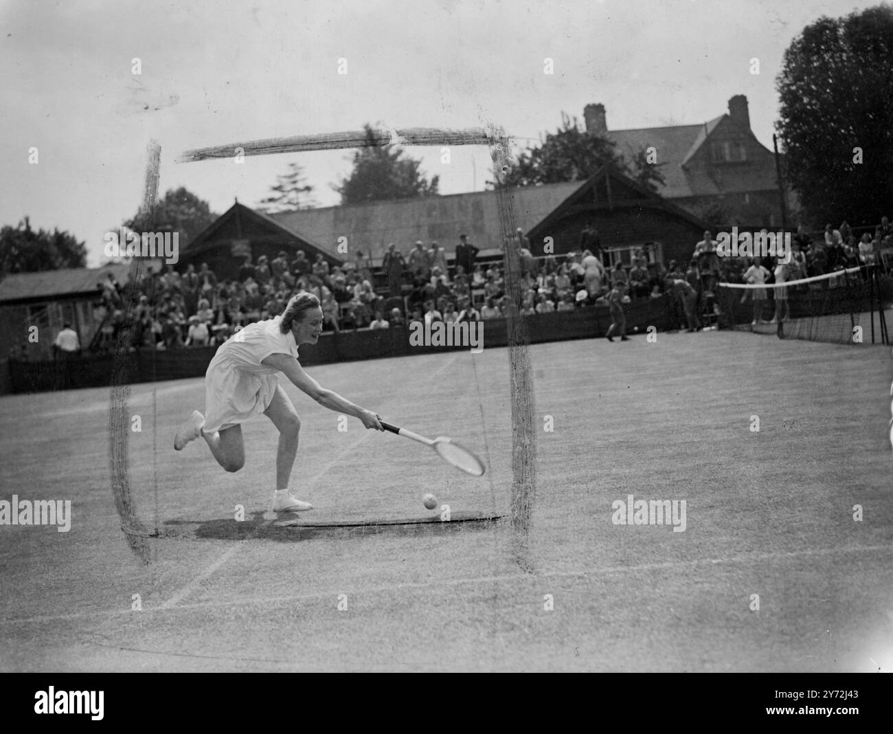 Mrs Sheila Summers of South Africa, fails to return this low shot from ...