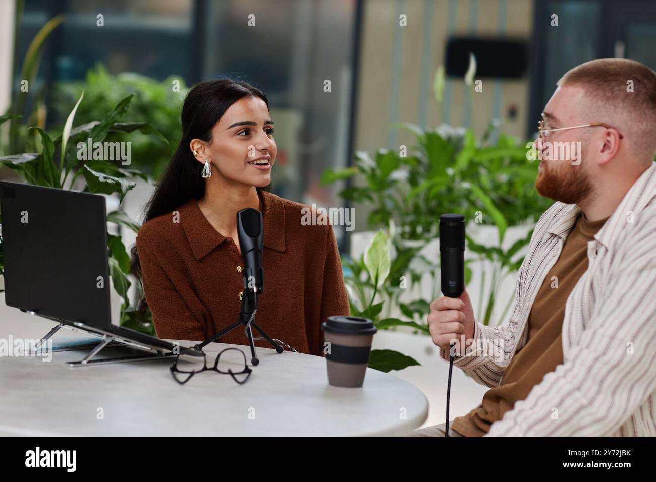 Engaging business conversation female host hi-res stock photography and ...