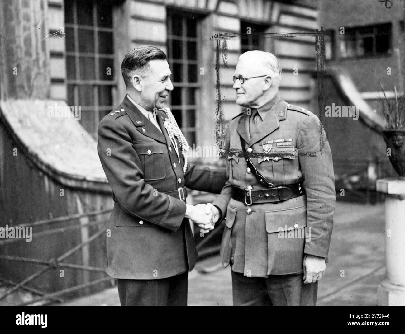 Lieut-Colonel Alexander Patterson Scotland OBE. (right) receives the ...
