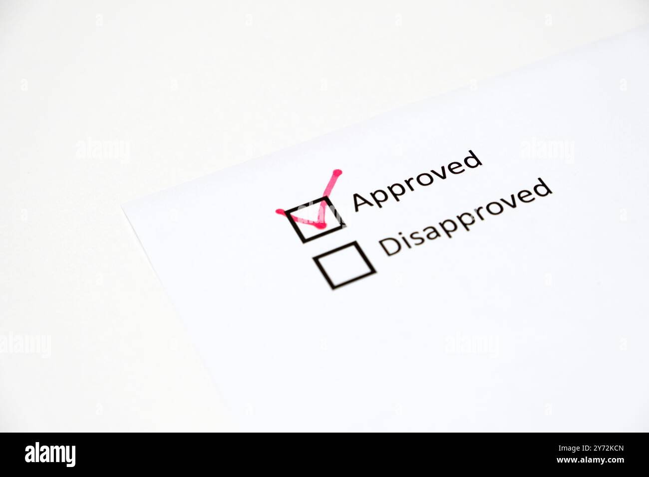 approved check box red on white sheet paper Stock Photo - Alamy