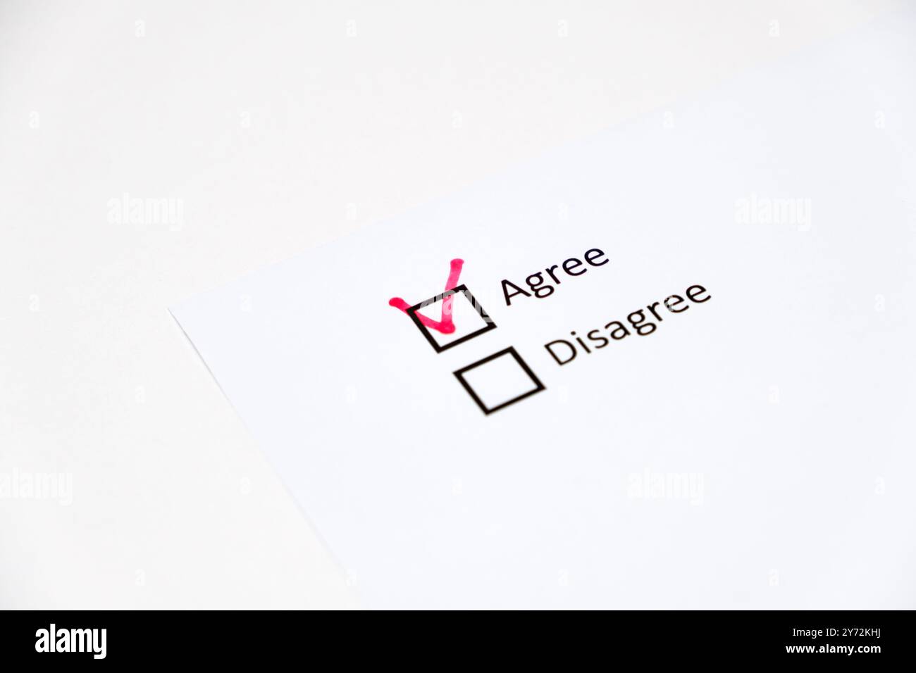 mark Agree checkbox with red on checklist on white paper Stock Photo ...