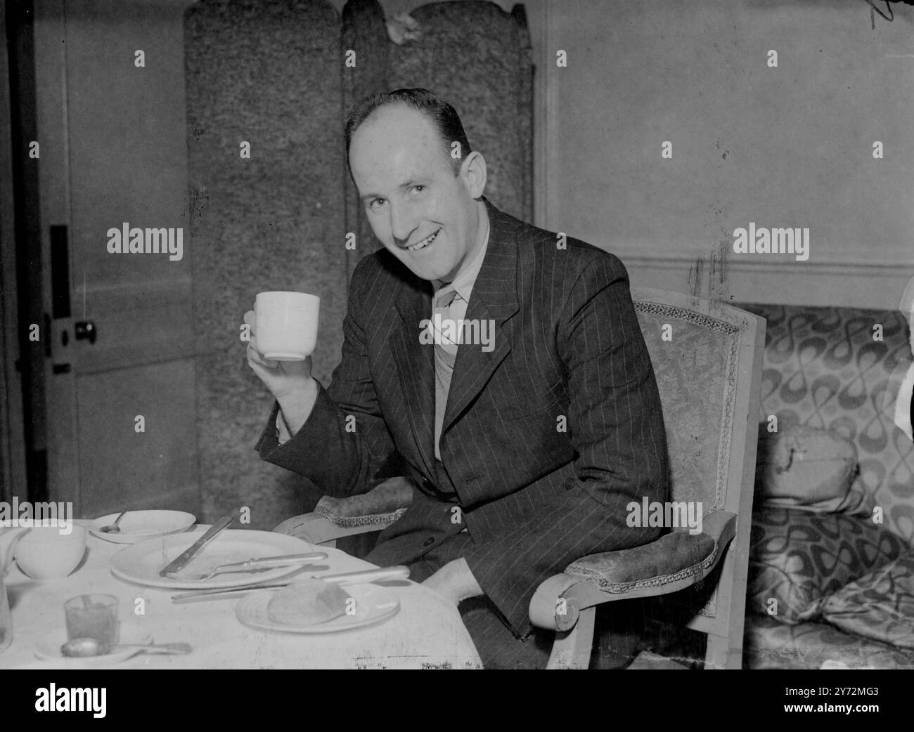 34-year-old Mr Edward Cross, Aberdeen bus driver, gives a £61,000 smile ...