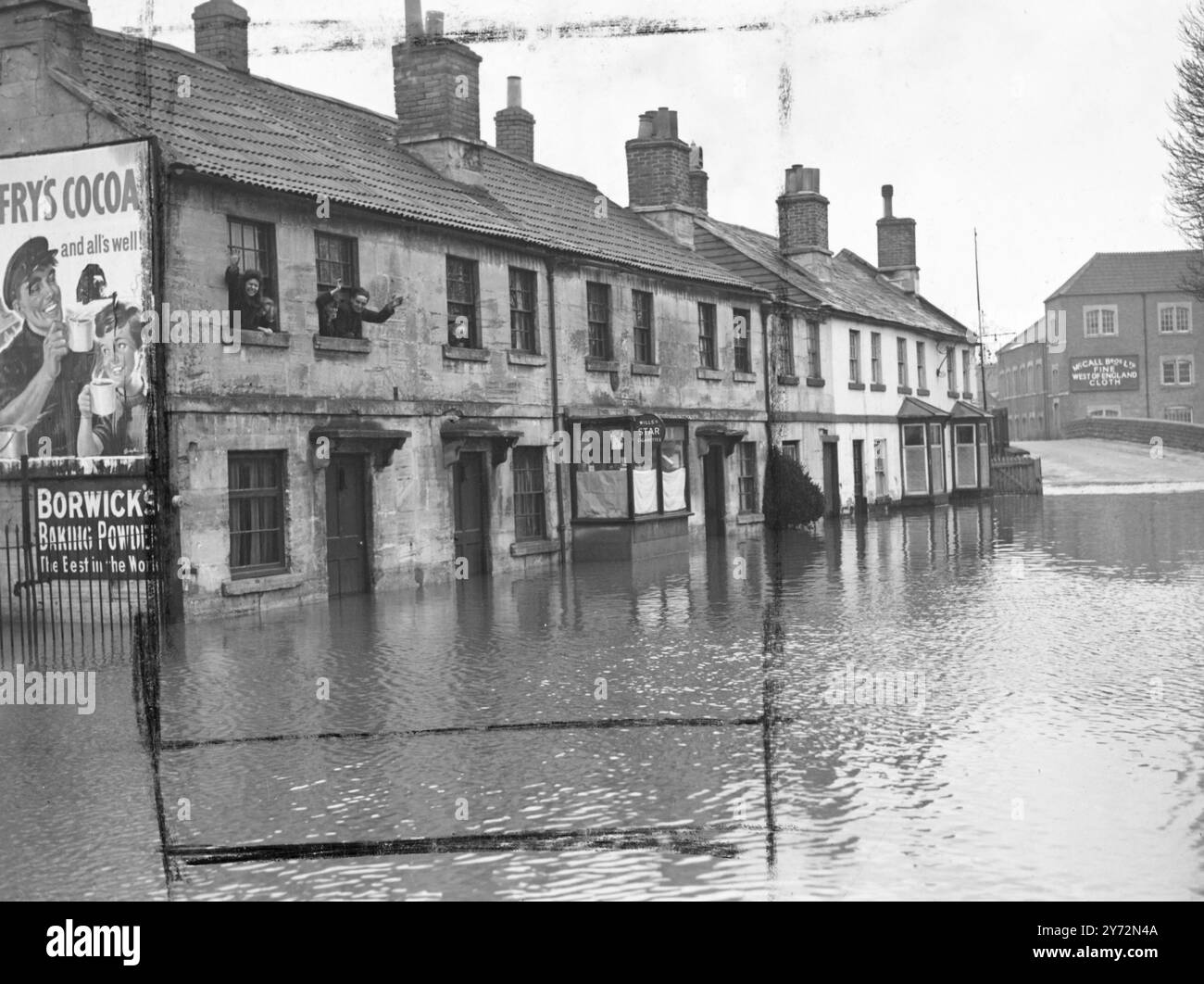 The River biss, swollen by melted snow, has overflowed its banks at ...