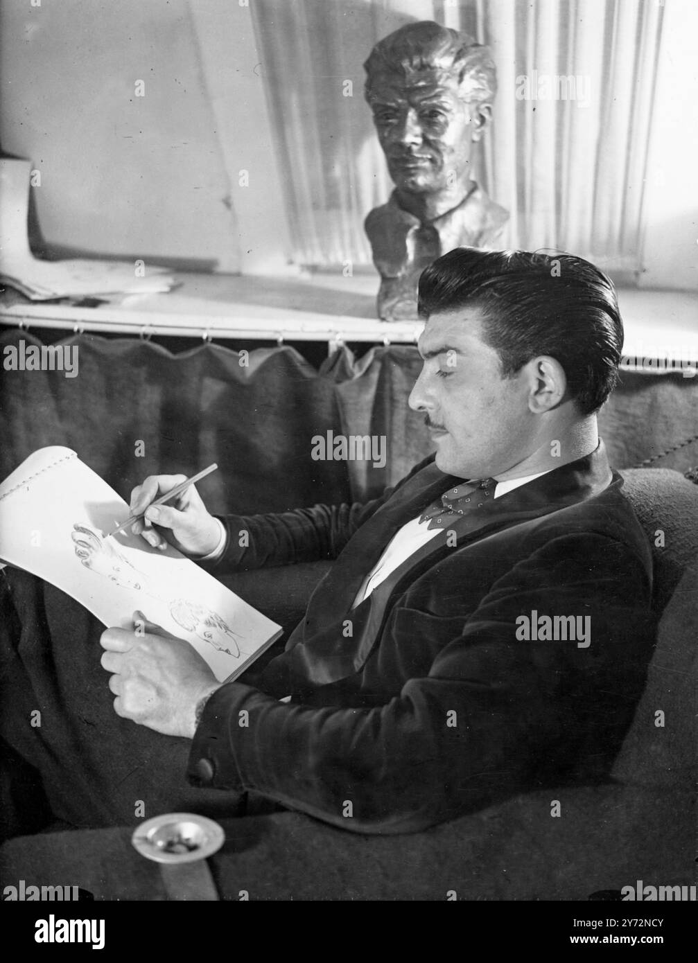 Raymond Bessone (Mr Teazie Weazie) sketching a new hair style Stock ...