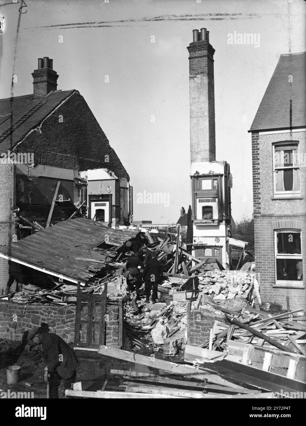 Gas explosion wrecked buildings. One woman was killed and several ...