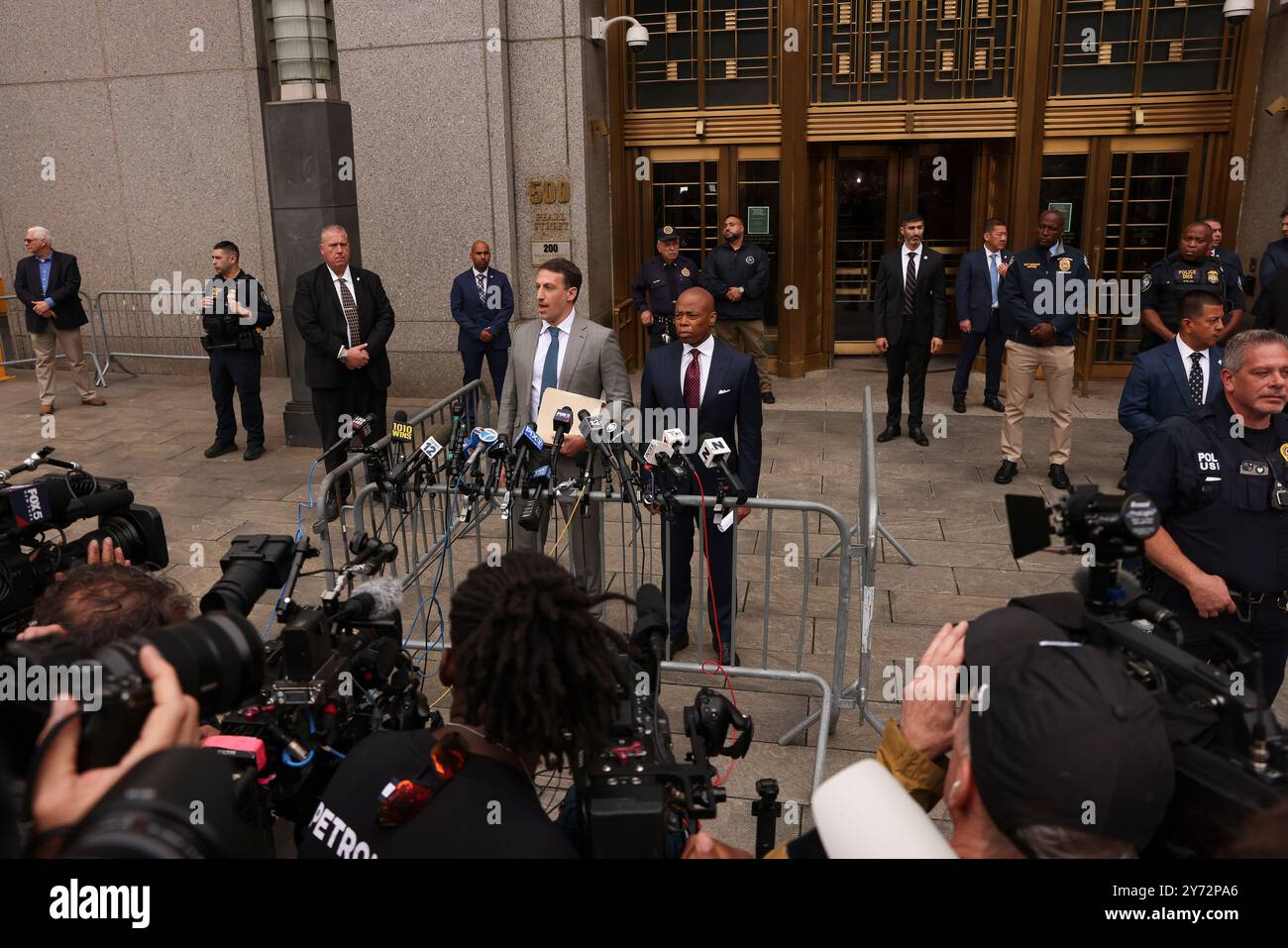 New York City mayor Eric Adams, right, appears with his attorney, Alex ...