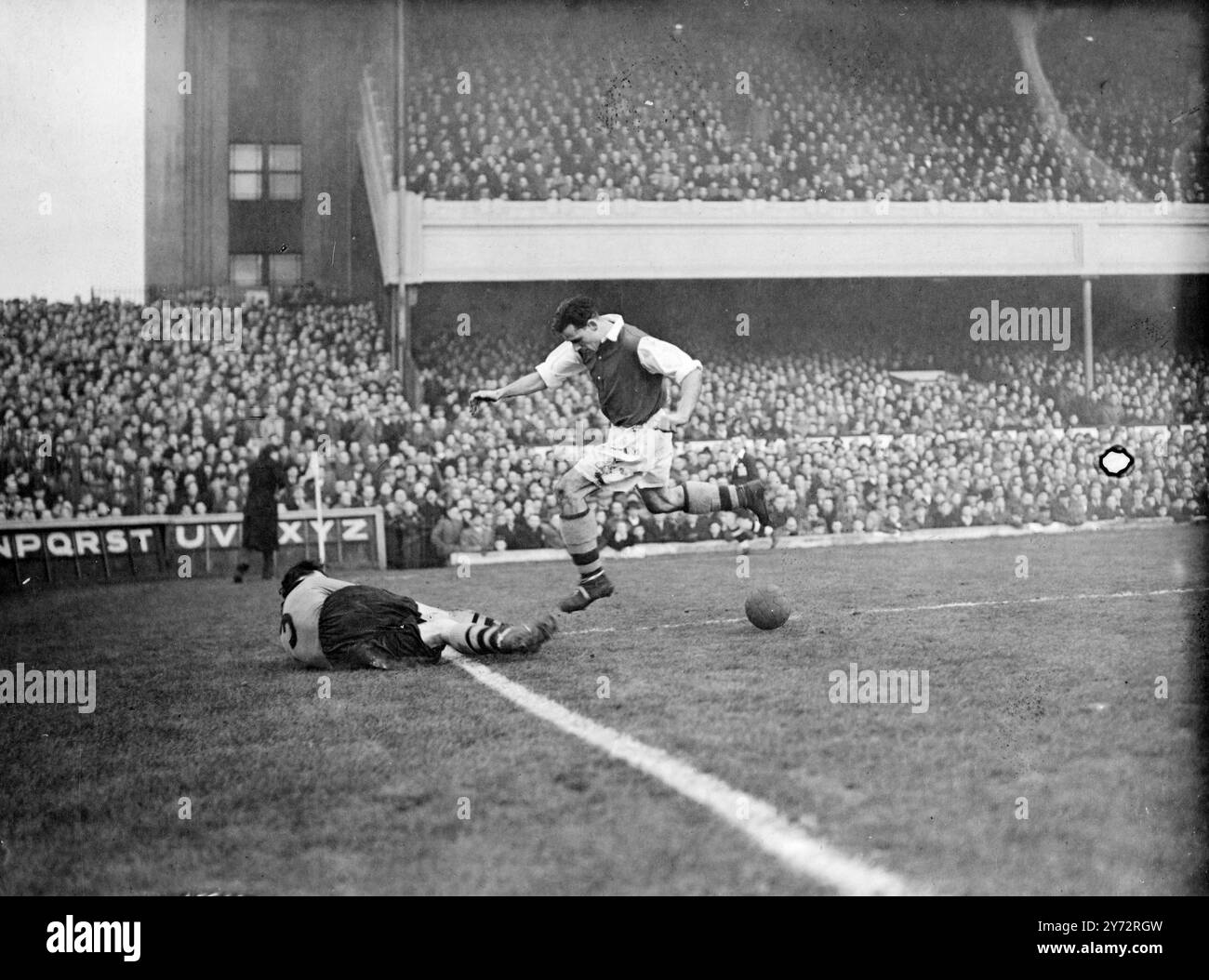 Saving the ball Black and White Stock Photos & Images - Alamy