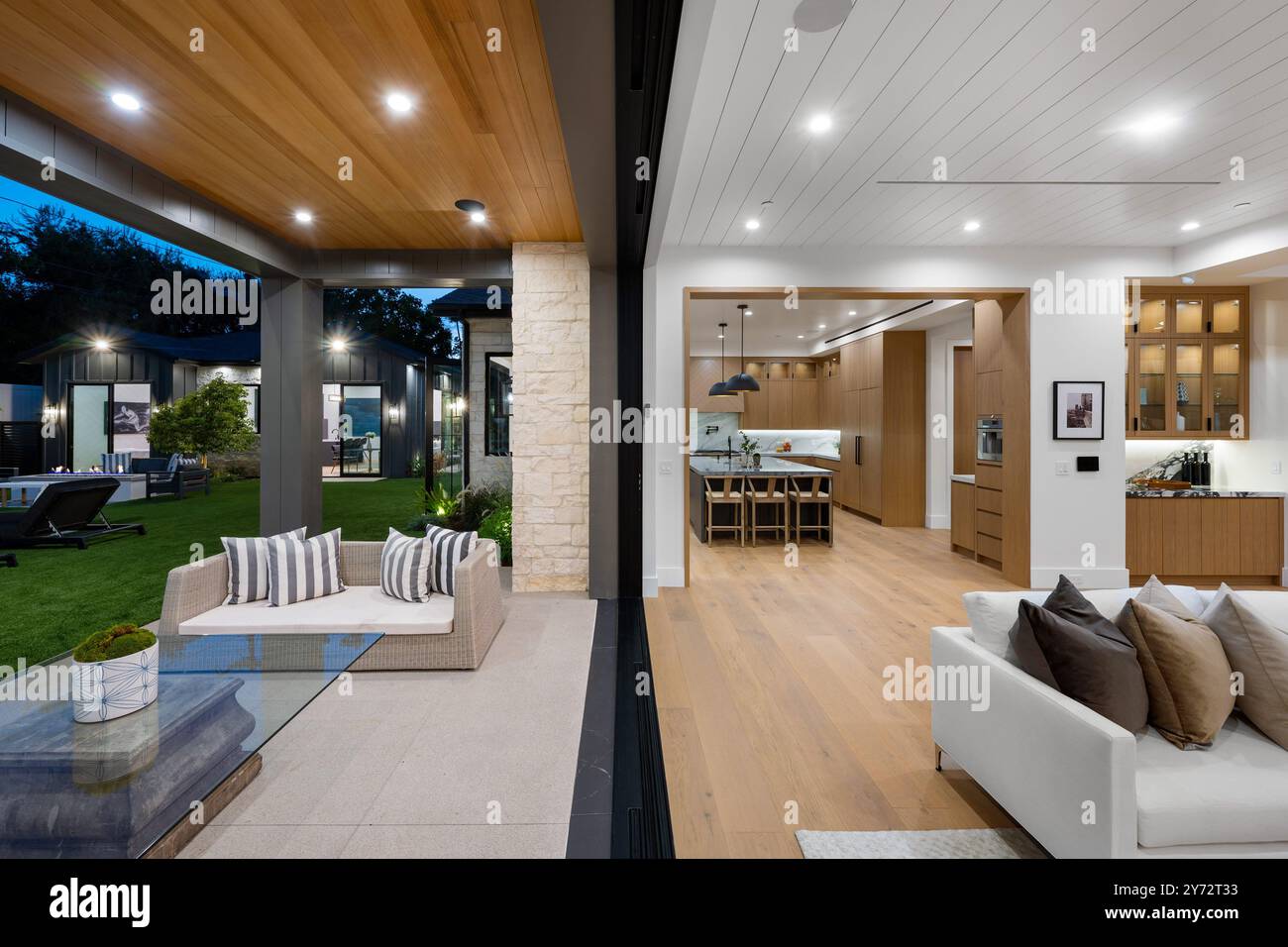 Modern open-concept indoor and outdoor living space with stylish ...