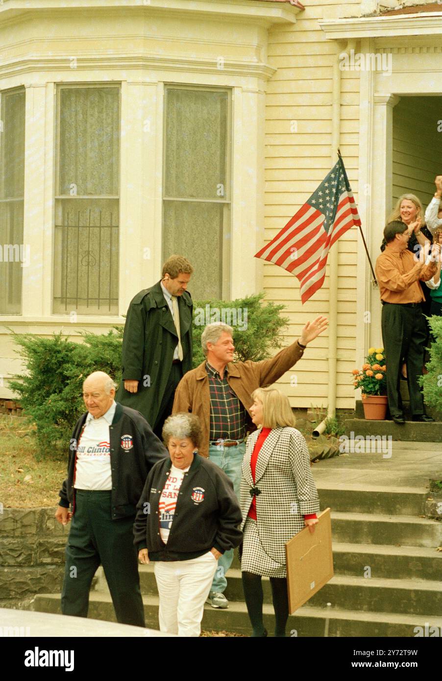 President-elect Bill Clinton, center, waves to friends and family as he ...
