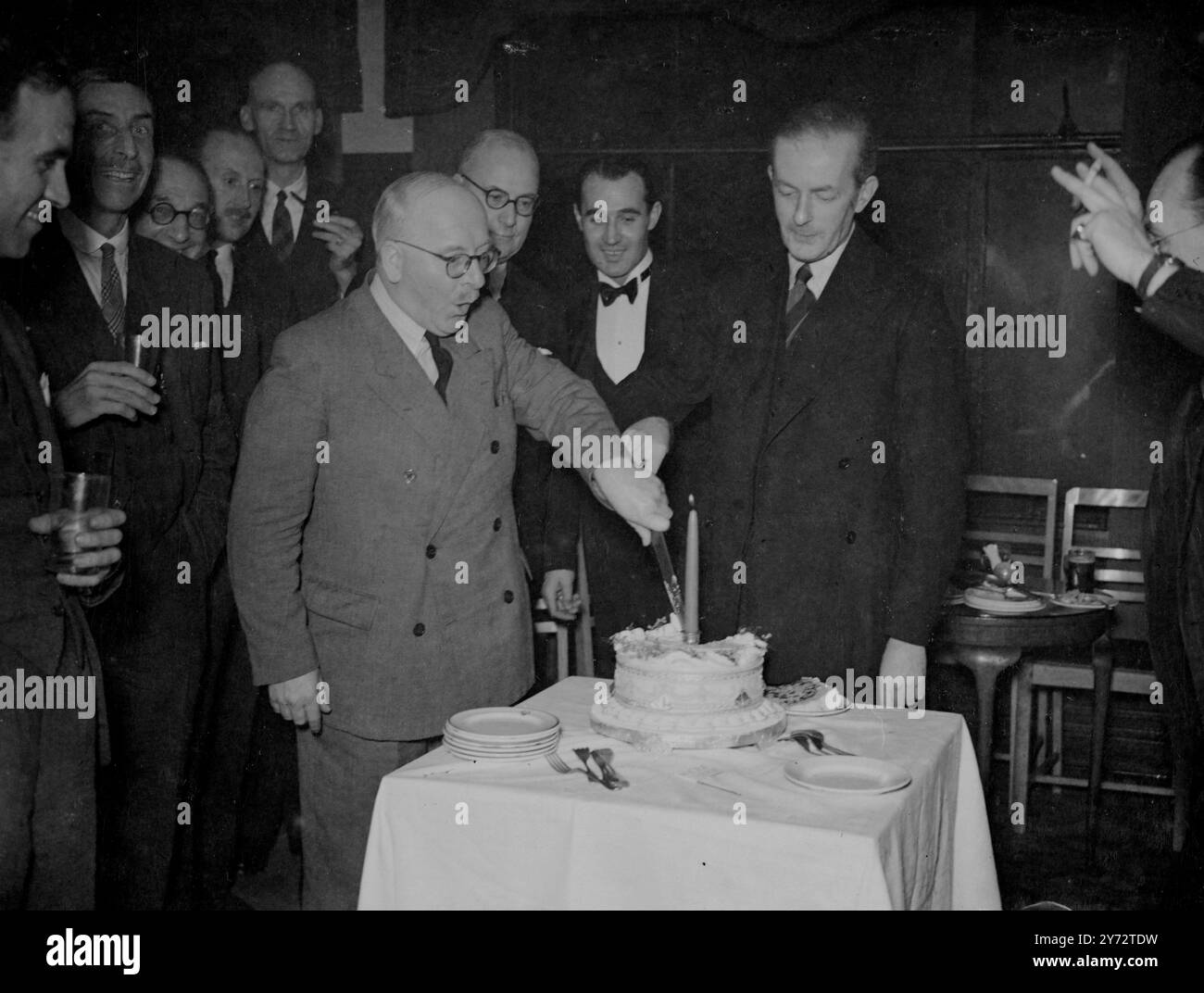 Photo shows left to right: C. Fleetwood, Reuters and Edward W. Davies ...