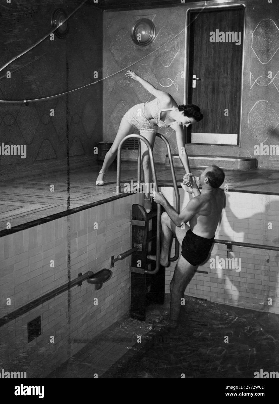 Passengers on the maiden voyage of the RMS "Queen Elizabeth" a luxury ...