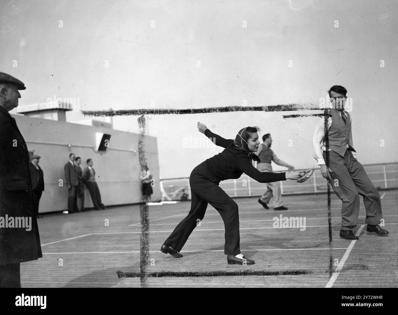 Passengers on the maiden voyage of the RMS "Queen Elizabeth" a luxury ...