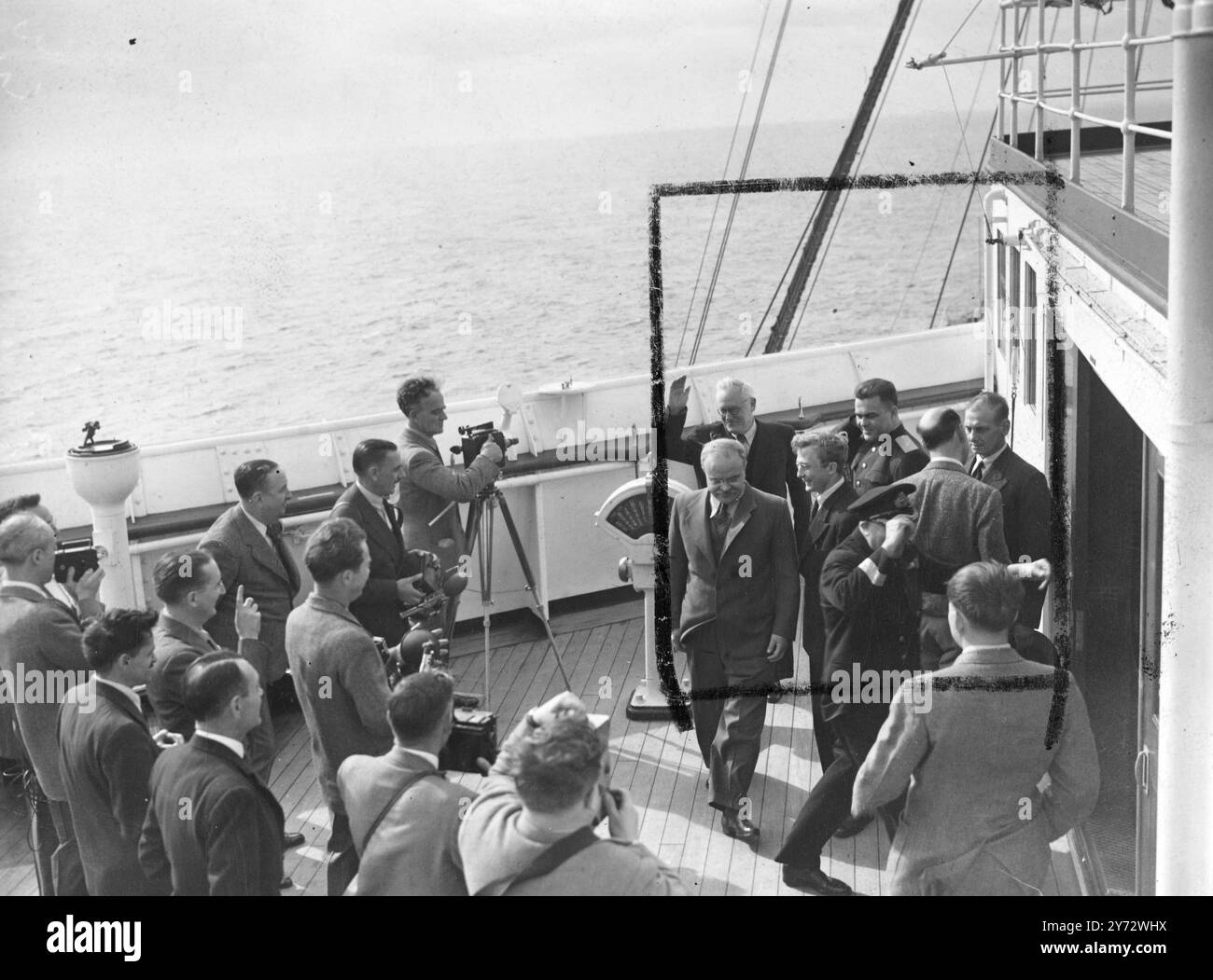 Passengers on the maiden voyage of the RMS "Queen Elizabeth" a luxury ...