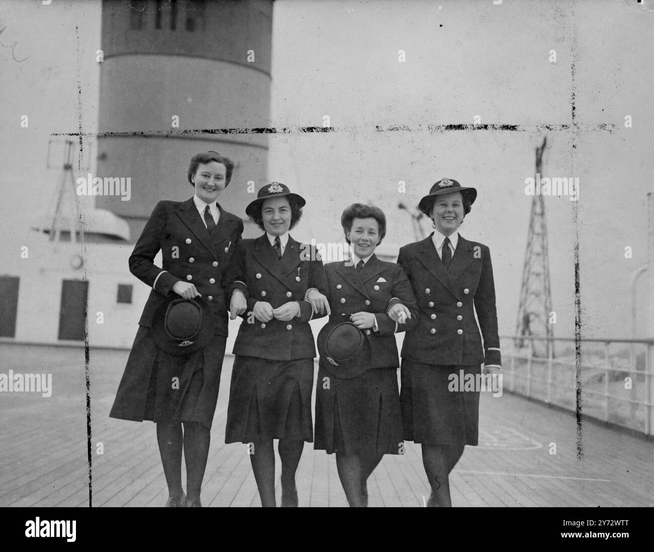 Last-minute preparations are going on board the great "Queen Elizabeth ...