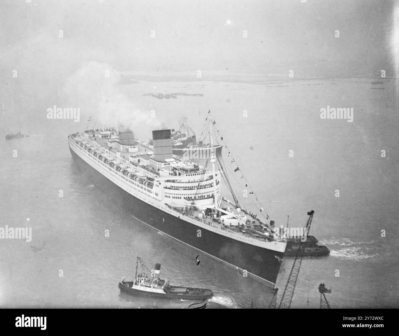The 83,000 ton Cunard-White Star Liner "Queen Elizabeth" cast off her ...