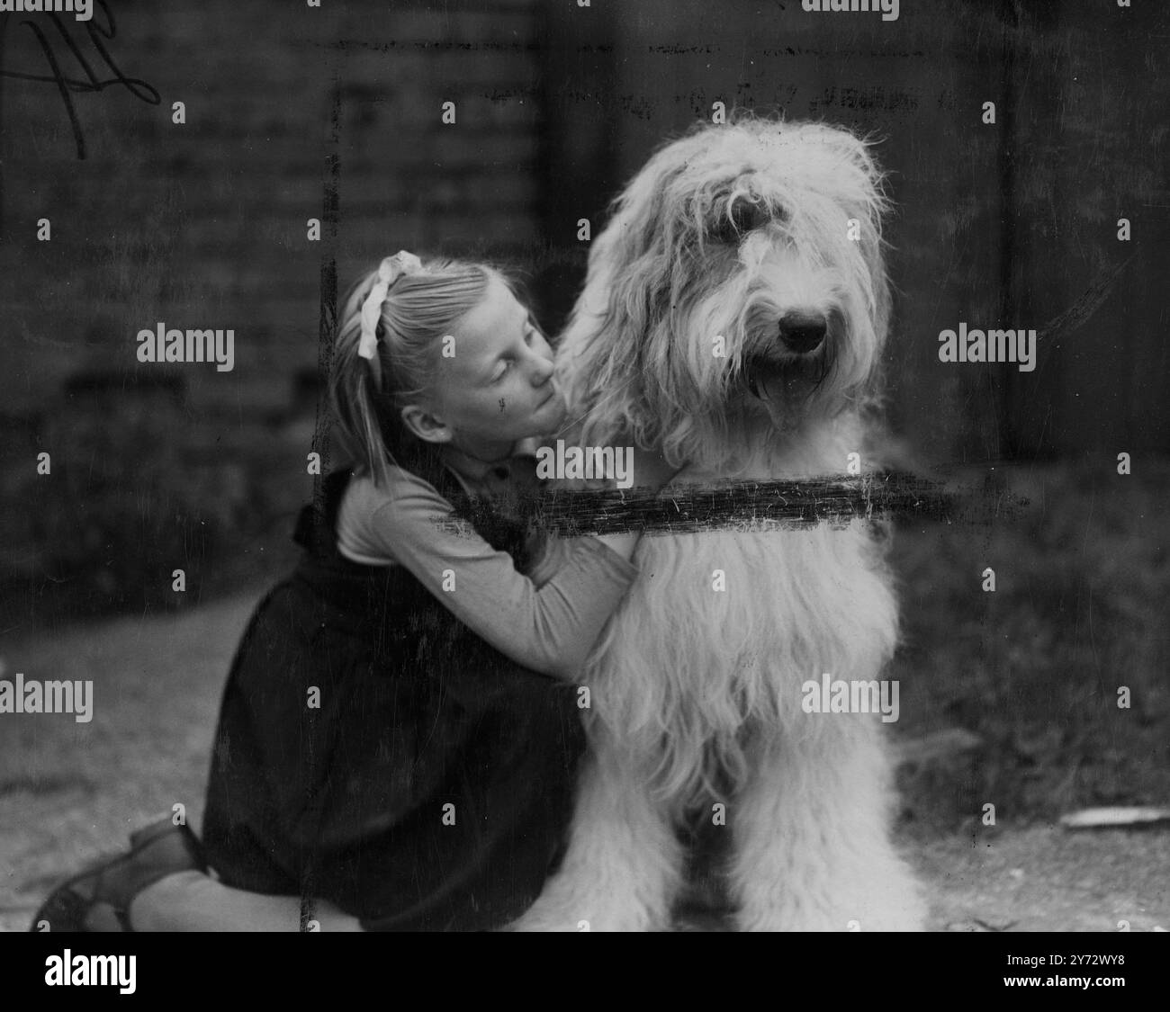 Little Rita Gallon was photographed with her mother's old English ...