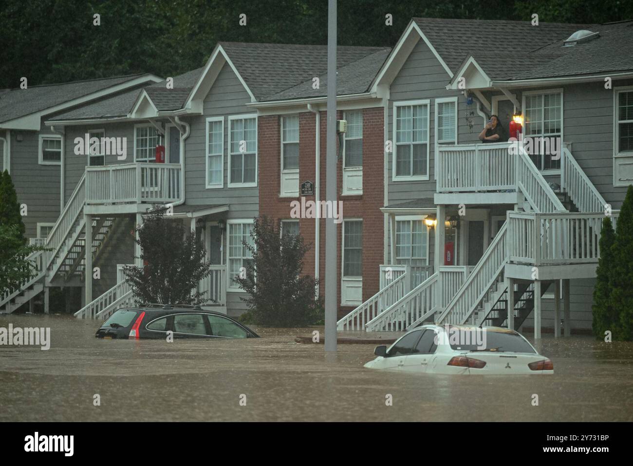Atlanta, Georgia, USA. 27th Sep, 2024. Flood surge traps cars and ...