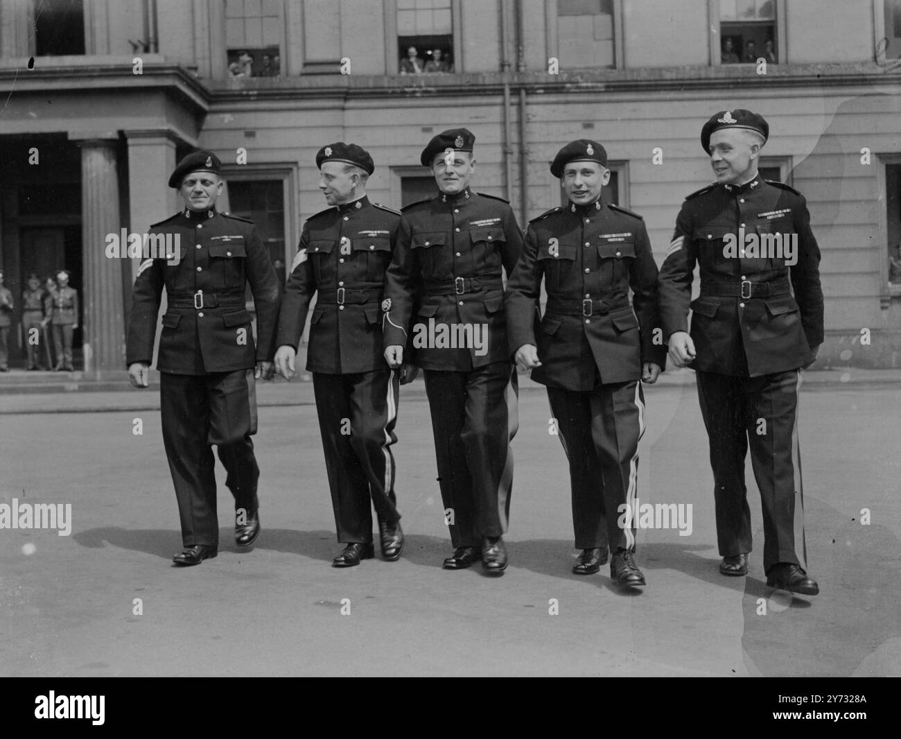 A detachment of 100 men and 3 officers paraded in their army's new blue ...