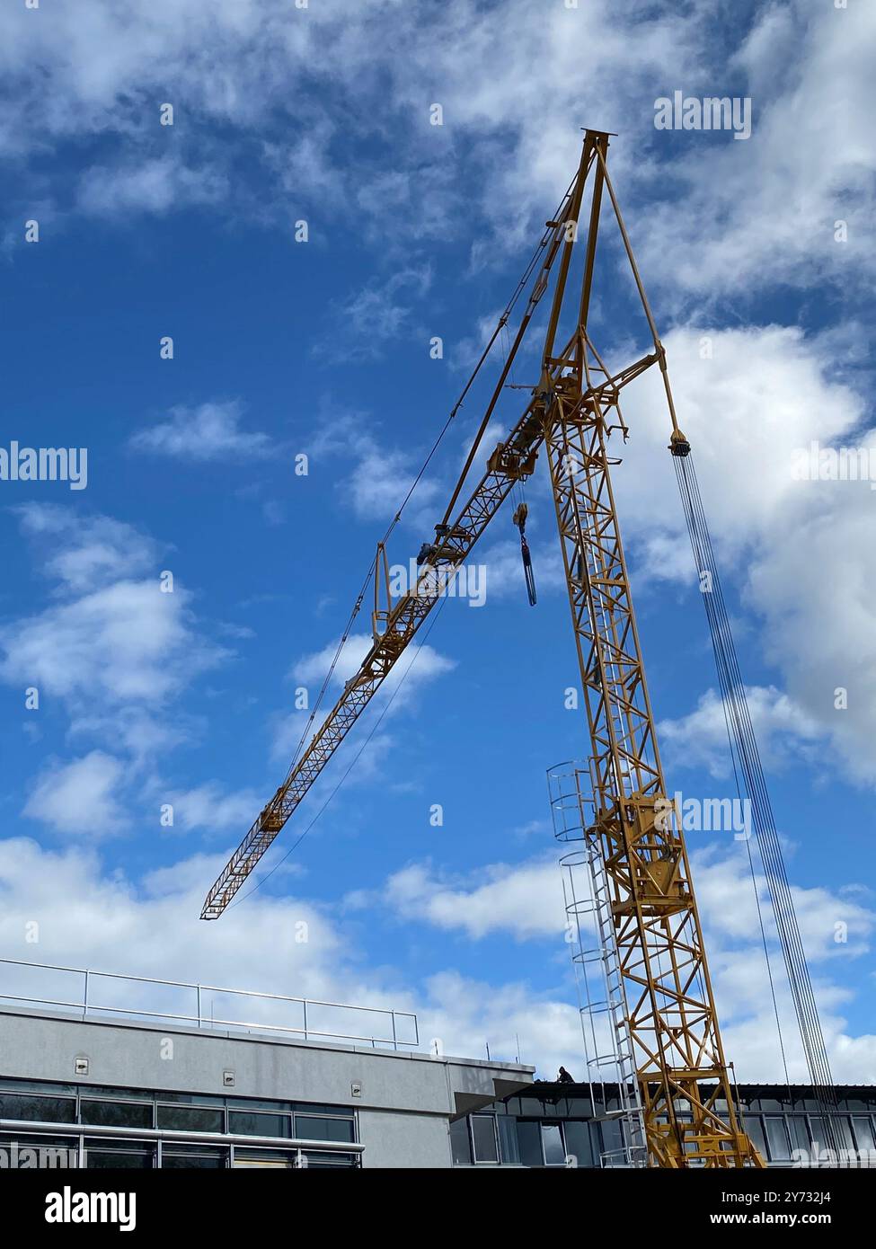 Top of yellow crane hi-res stock photography and images - Alamy