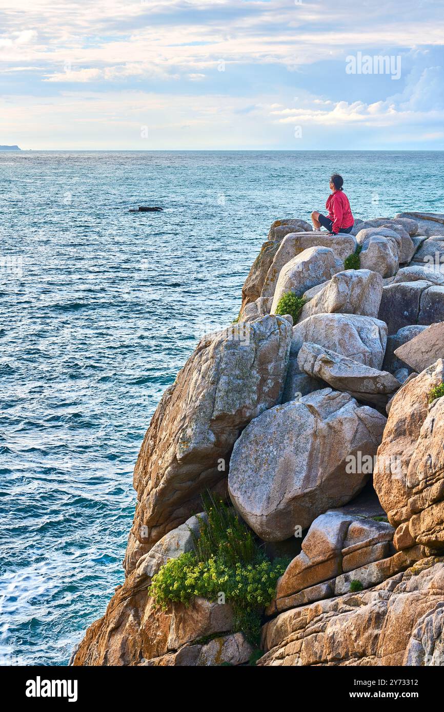 Beautiful woman admiring lighthouse background hi-res stock photography ...