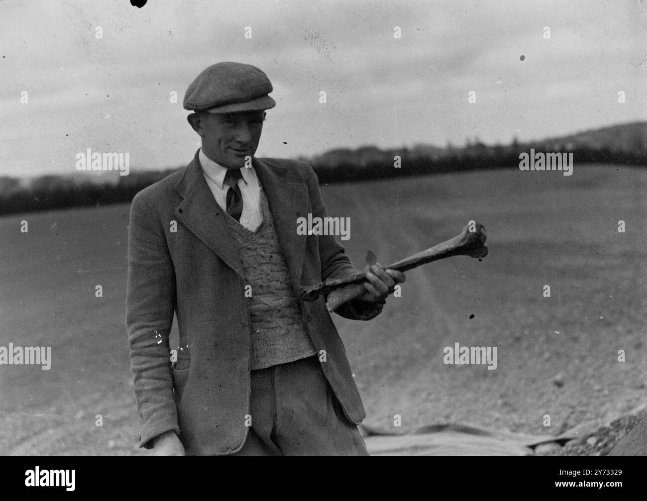 Bones stated to be those of a man more than 6'4" in height together ...