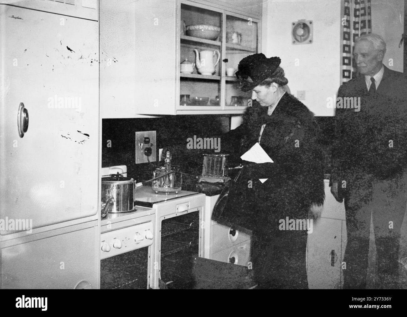 Mrs Attlee - wife of Prime Minister inspects an all electric kitchen at ...