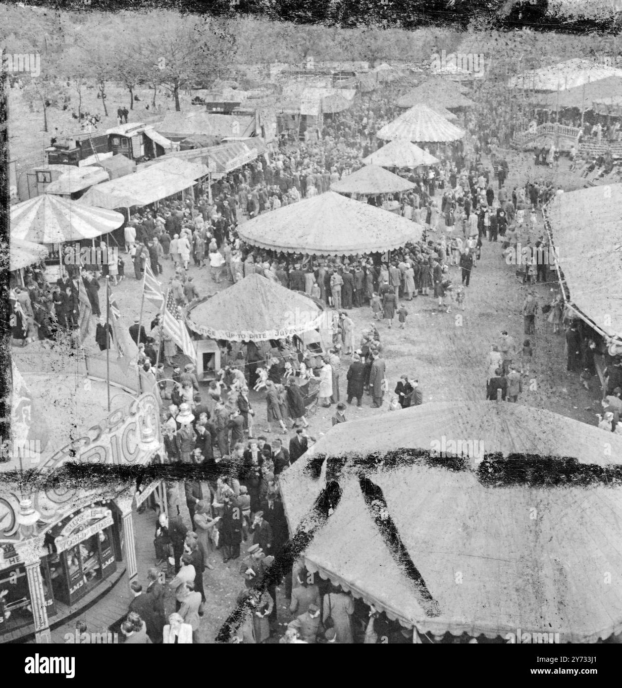 Aerial view of people enjoying themselves at amusement booths at ...