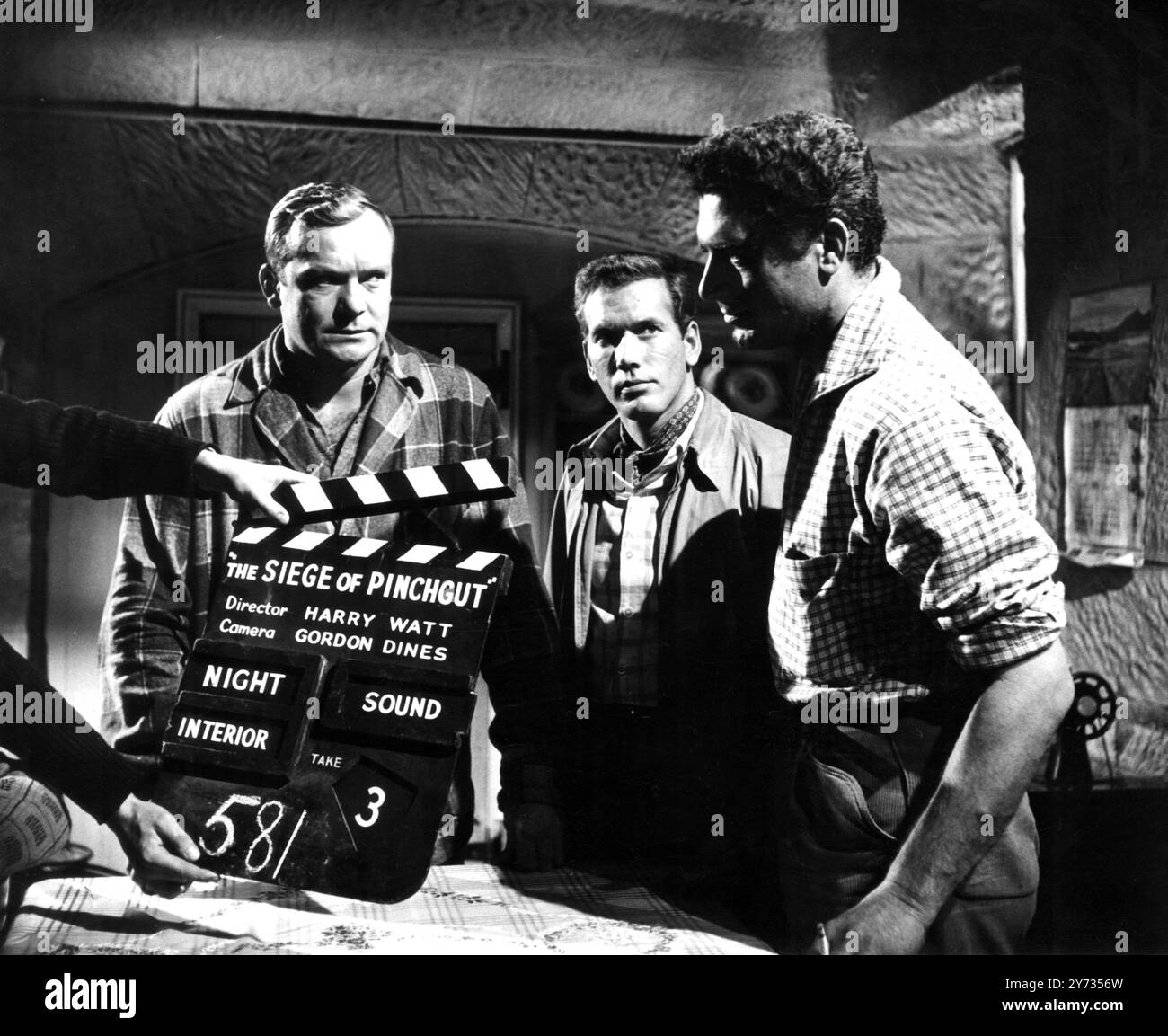 Ealing Studios. The filming of the British thriller, The Siege of ...