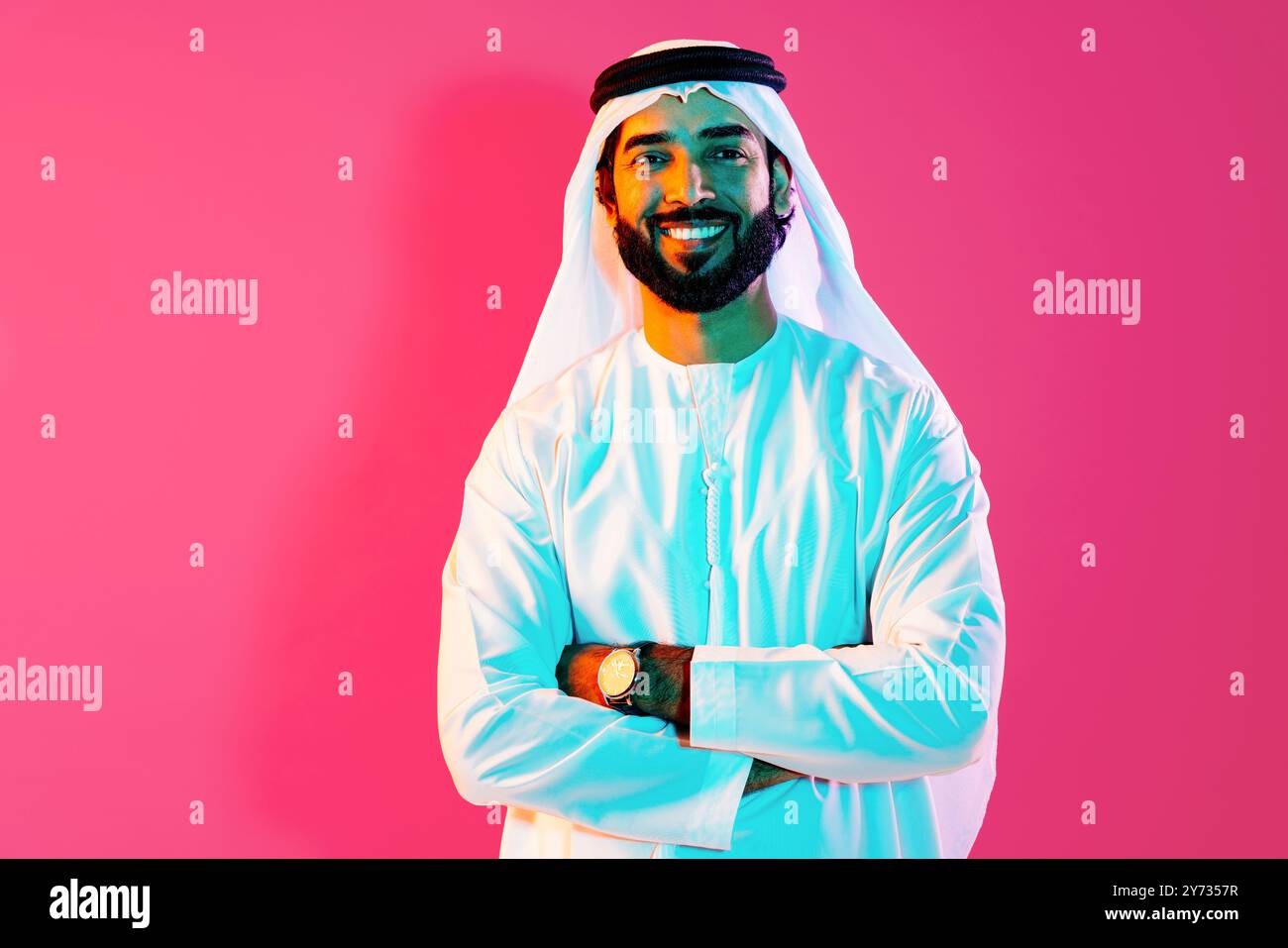 Arab businessman wearing emirati kandura portrait in studio in Dubai ...