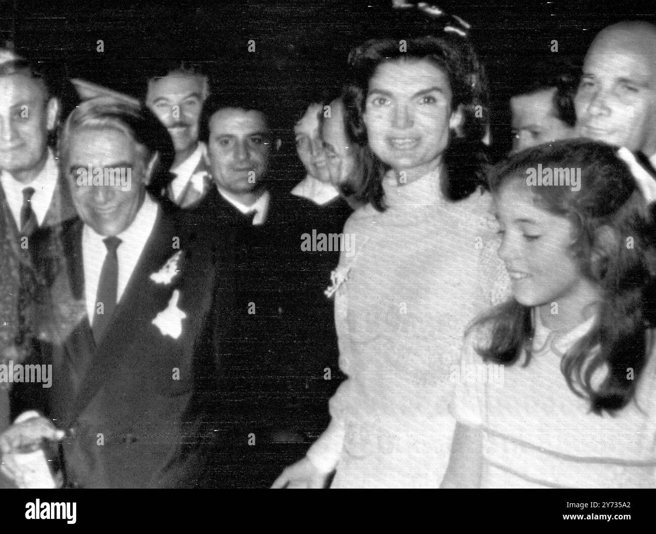 Aristotle Onassis ( 2nd left) and his bride Jackie Kennedy during the reception on board Onassis ...