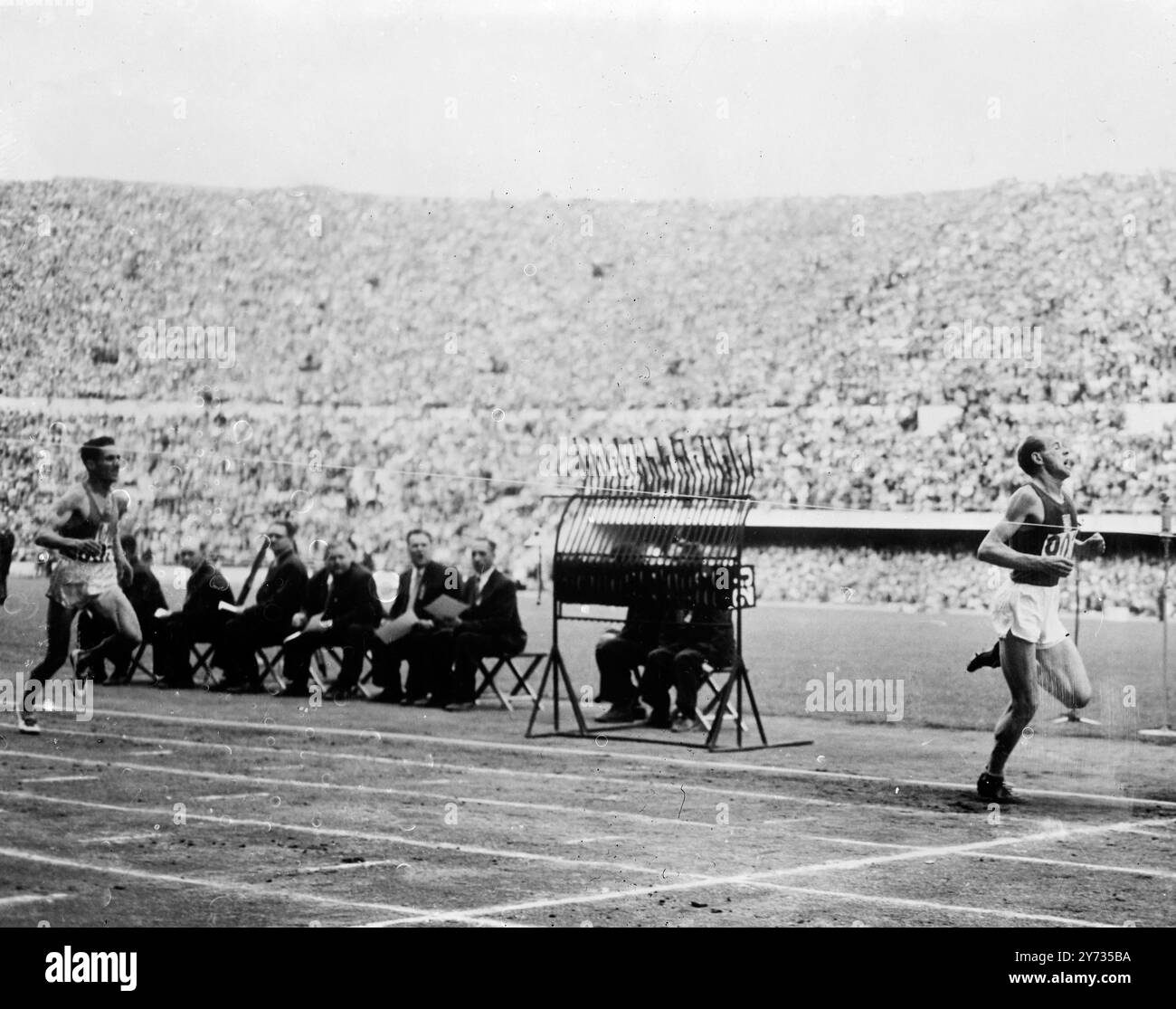 Zatopek wins 5000 metres and breaks record. Zatopek (903) winning the ...