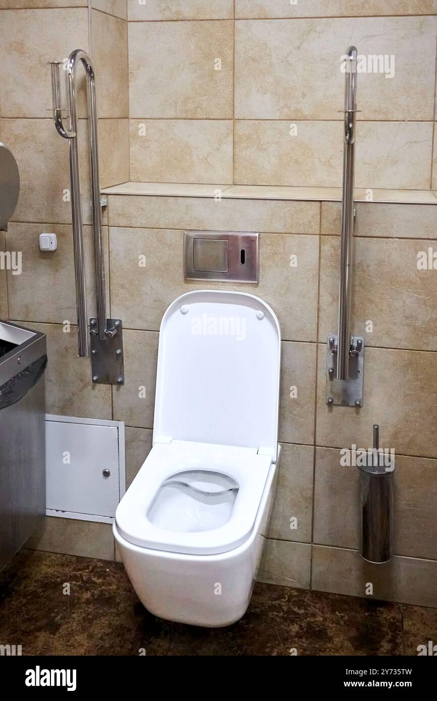 Interior of specially adapted bathroom toilet with friendly design for ...