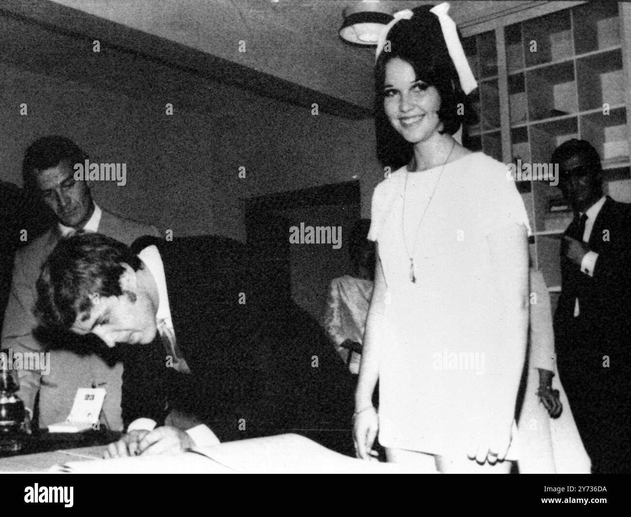 Gavin Hodge (24) signs the register to marry his runaway bride 16 year ...