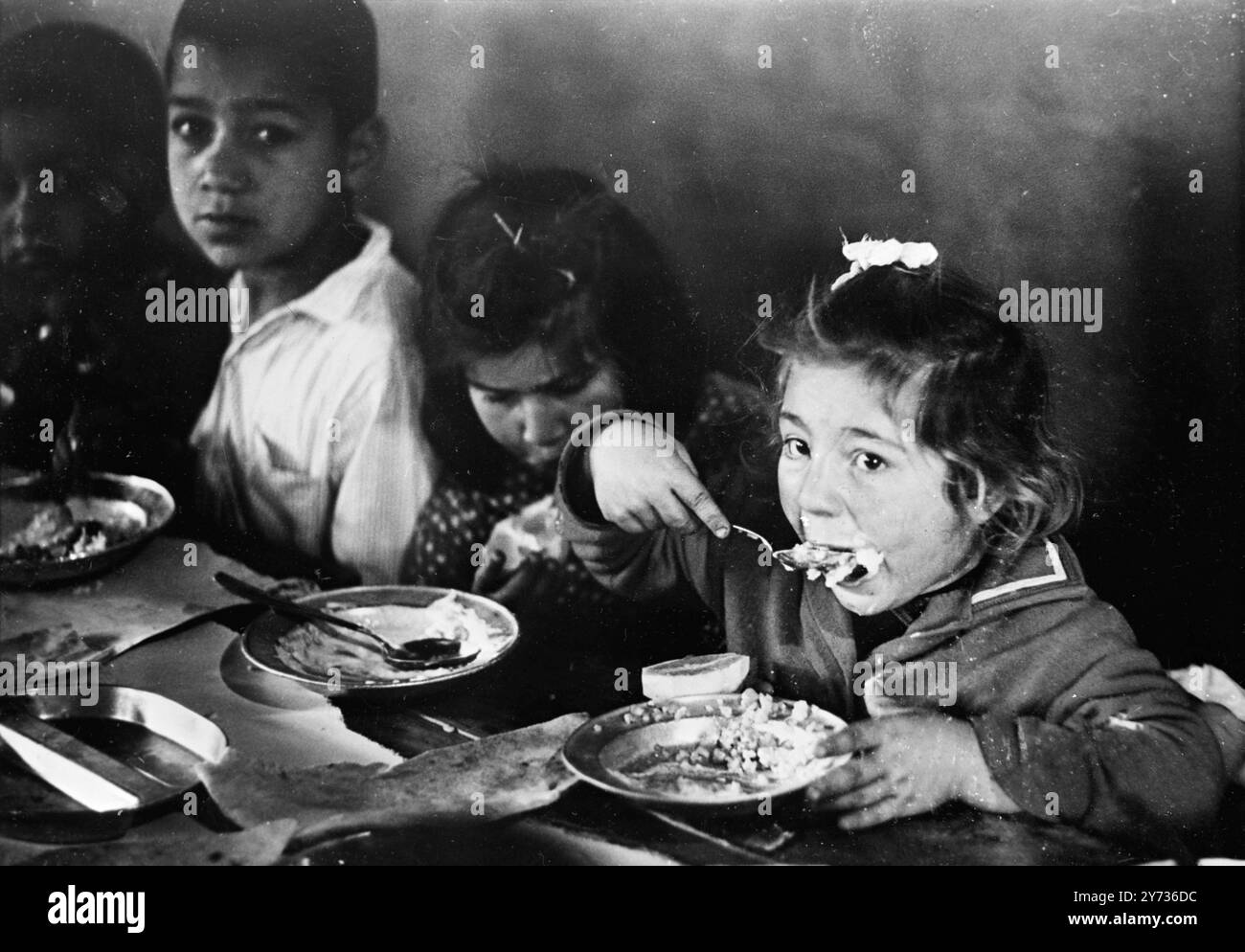 Lebanon, Beirut ; Refugee children eat their noon meal suplied by UNWRA ...