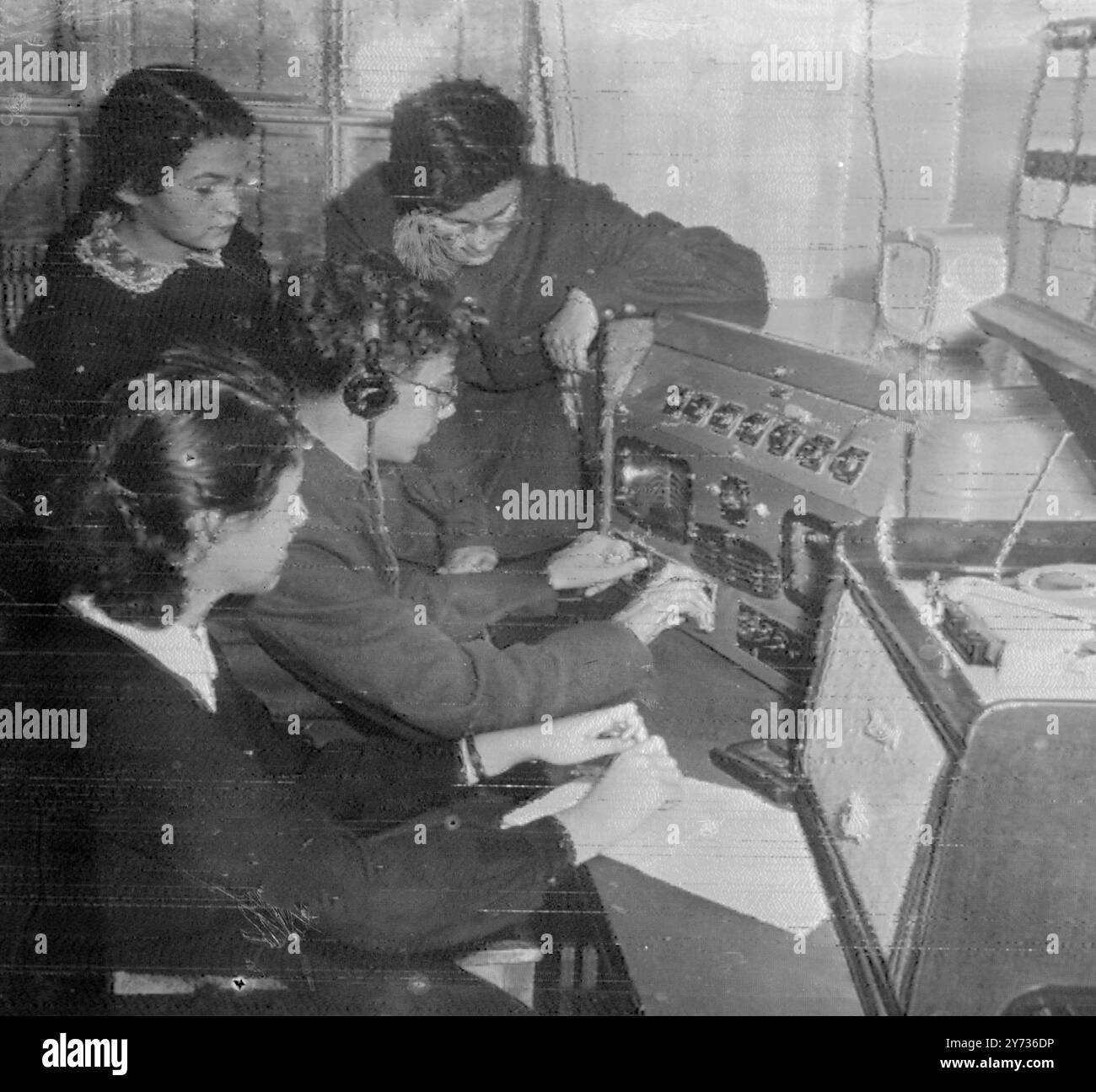 Russian students follow Sputnik II. Senior High School students listen ...