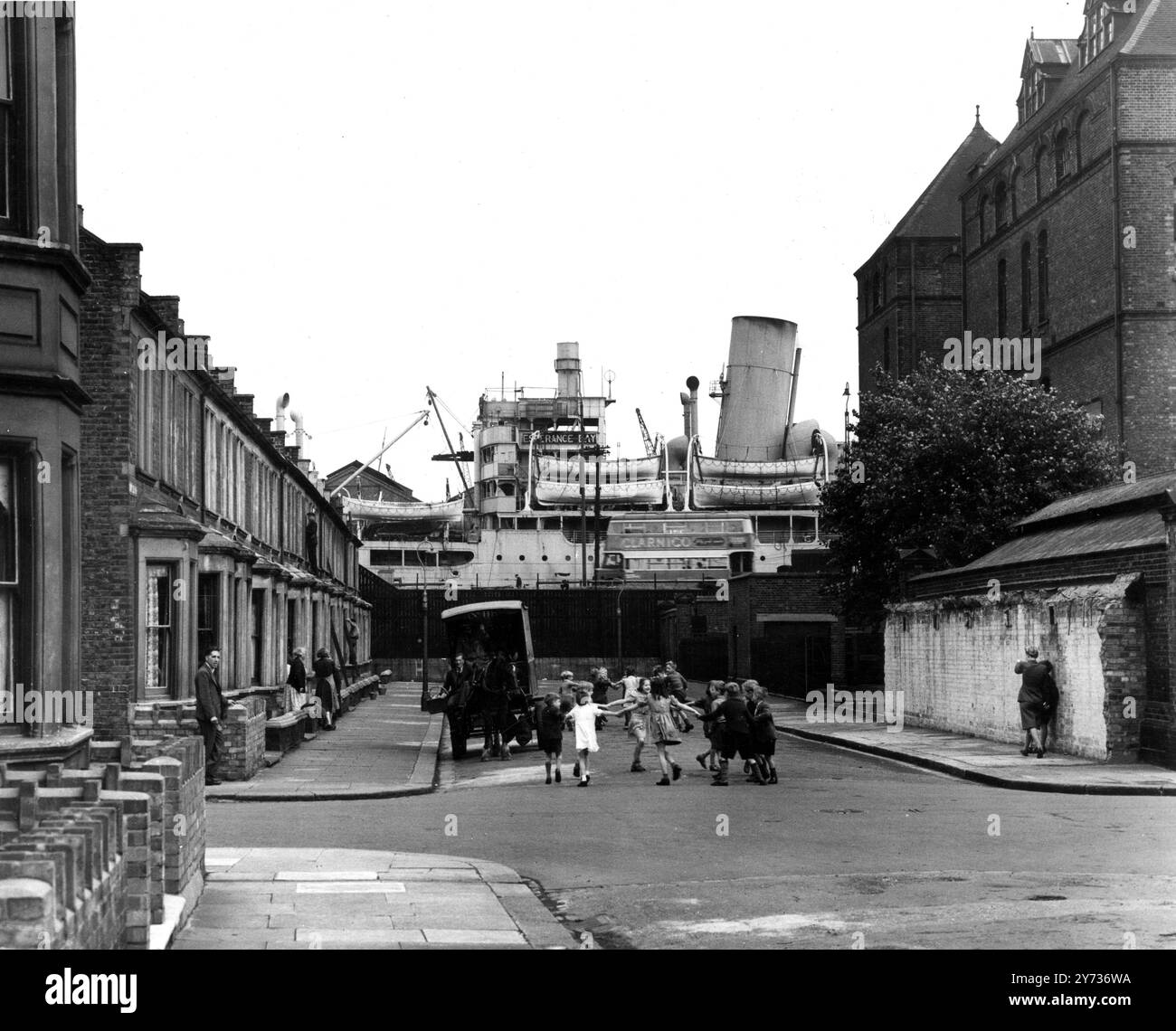 Children playing in dock side street , Silvertown , London , England ...
