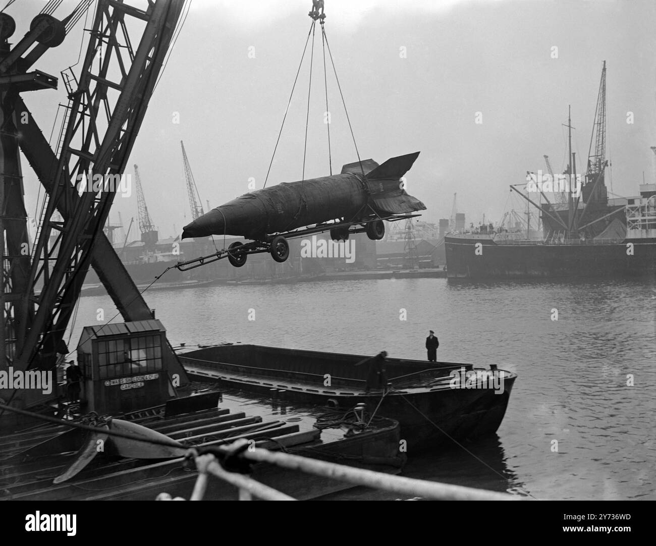 A huge German V2 rocket was loaded in London docks onto the liner SS ...
