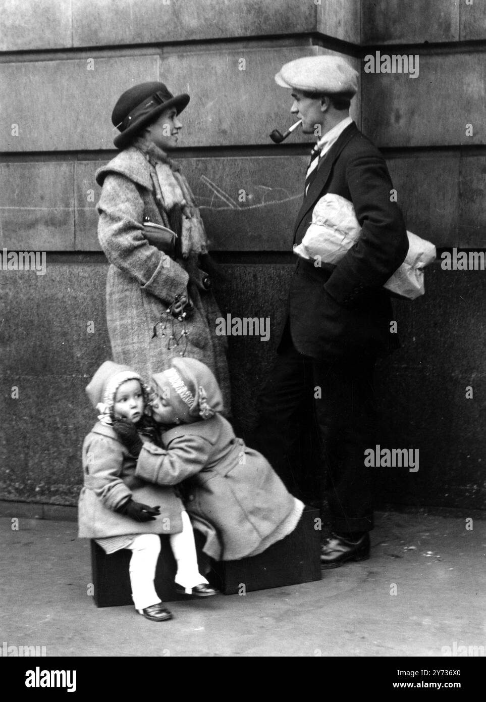 Kissing under mistletoe children Black and White Stock Photos & Images ...