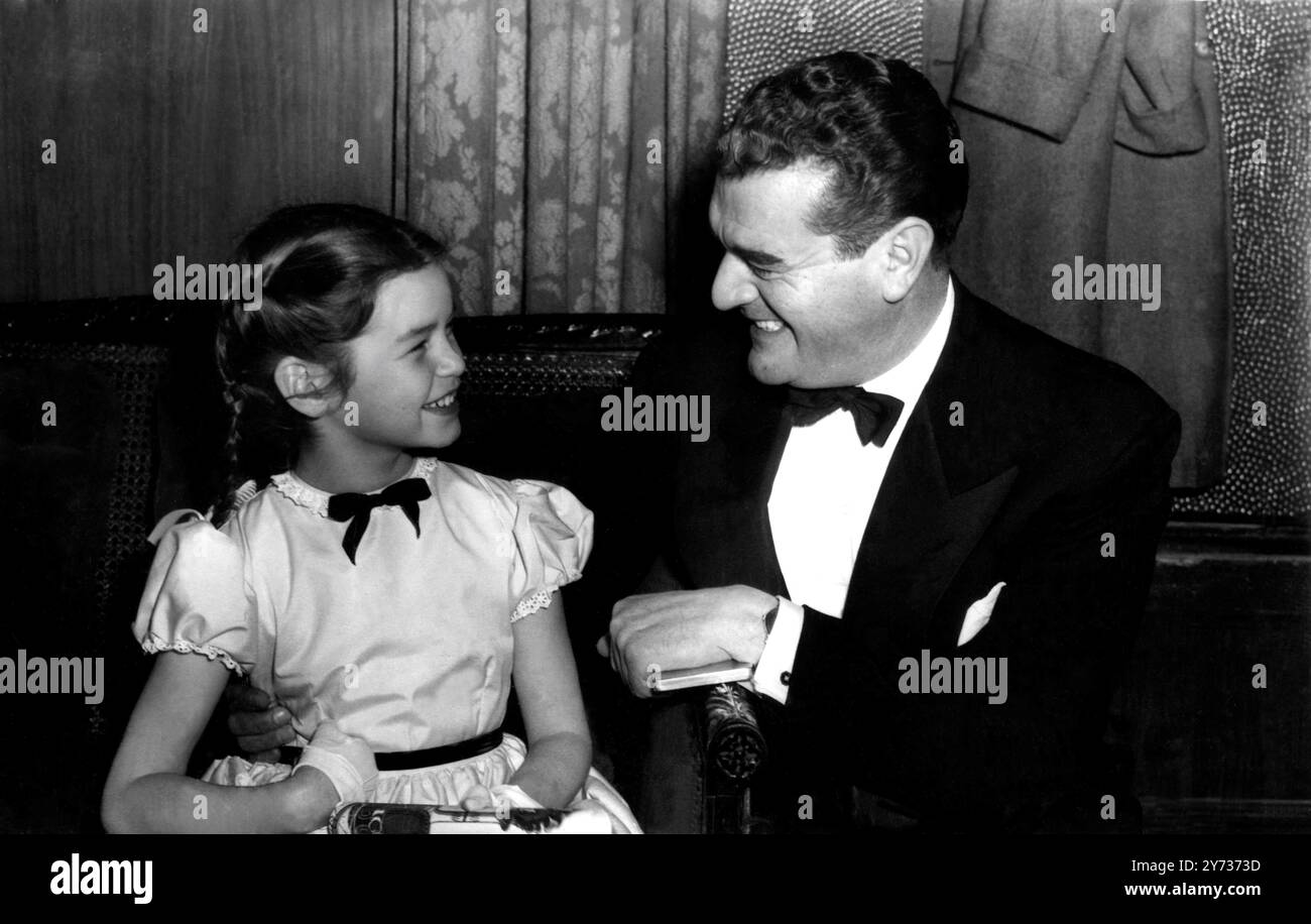 Mandy at the Premiere. Screen star Jack Hawkins, chatting with child ...
