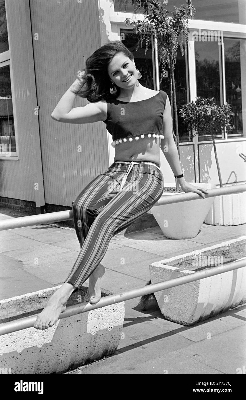 Film actress Norma Foster relaxes after enjoing the fun of the fair at ...