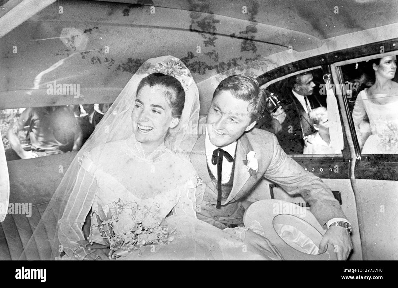 Picture driving off after their wedding at St Nicholas Church , near ...