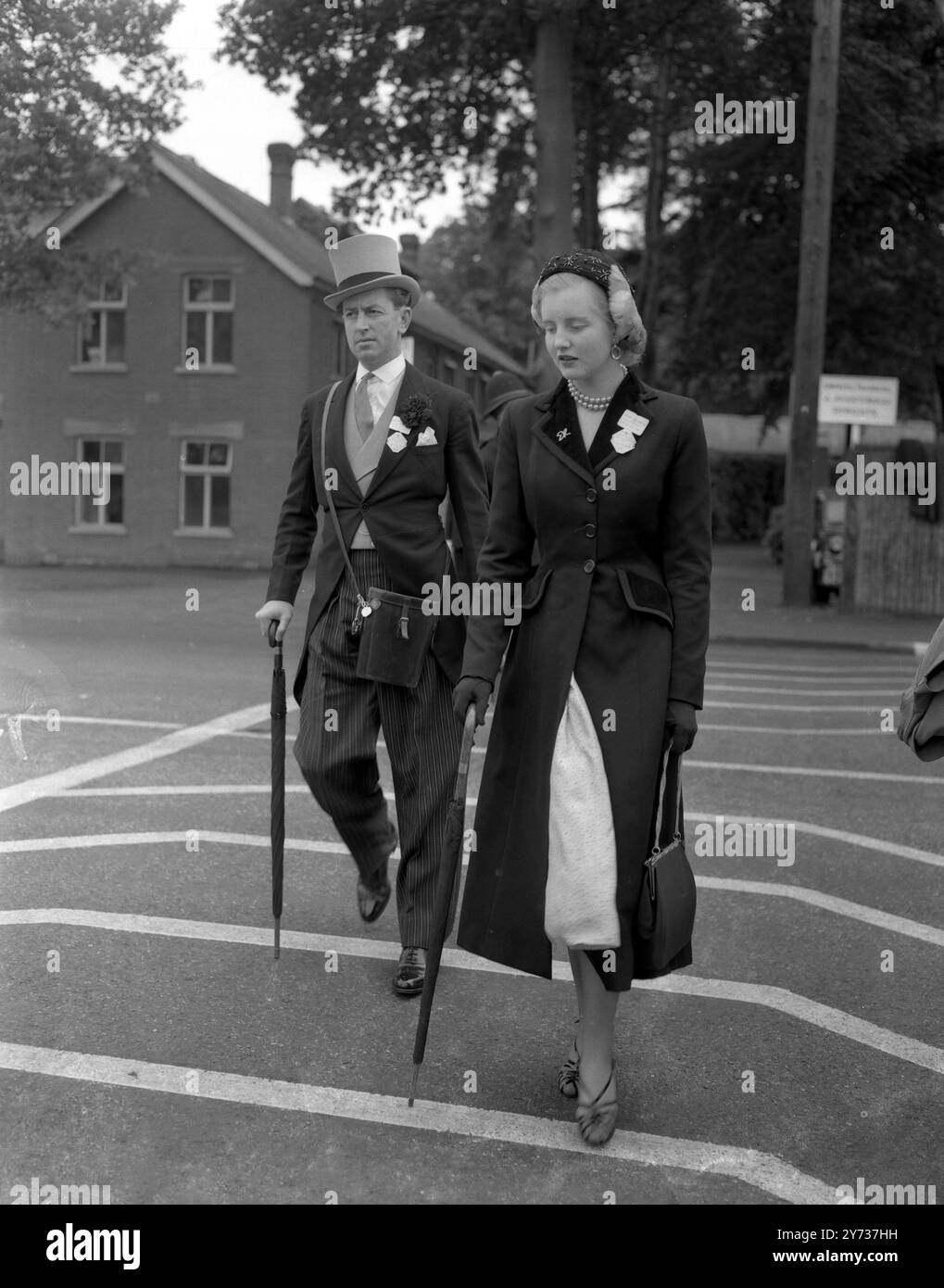 Wearing a monogram ' ER ' on the lapel of her coat is Lady Anne Coke ...