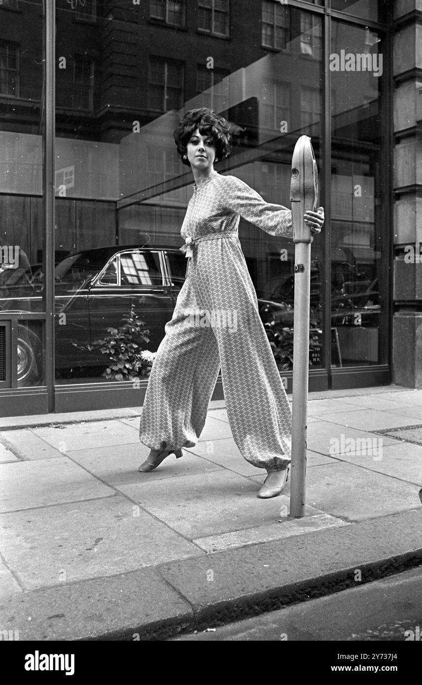 Cilla Johnson , models a carrot colour cat suit in printed jacquard ...