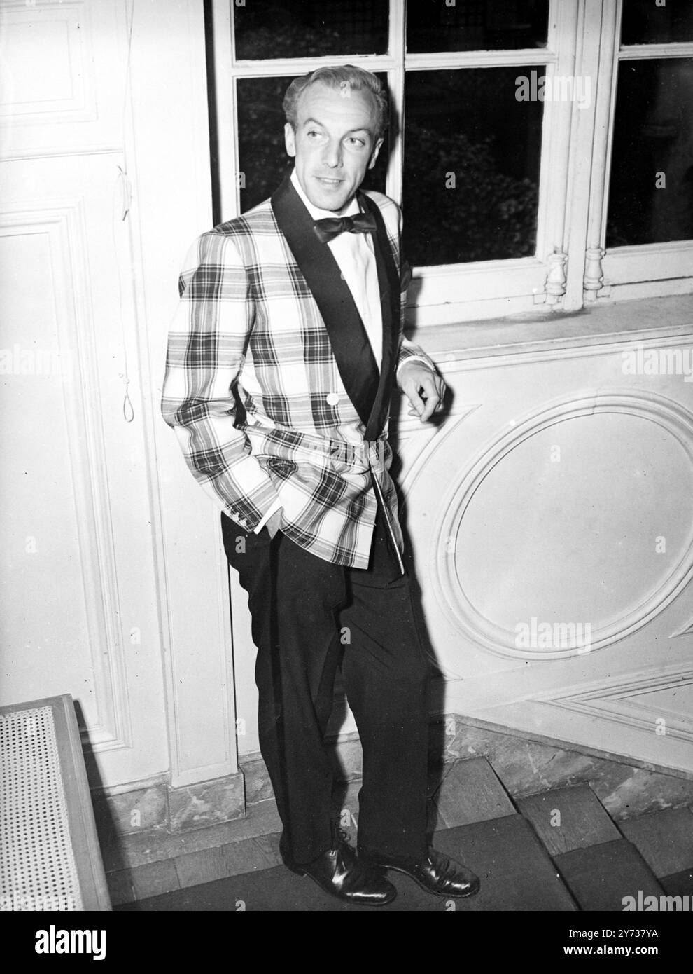 Jacques Fath in his red and white Scots tartan dinner jacket inspired ...