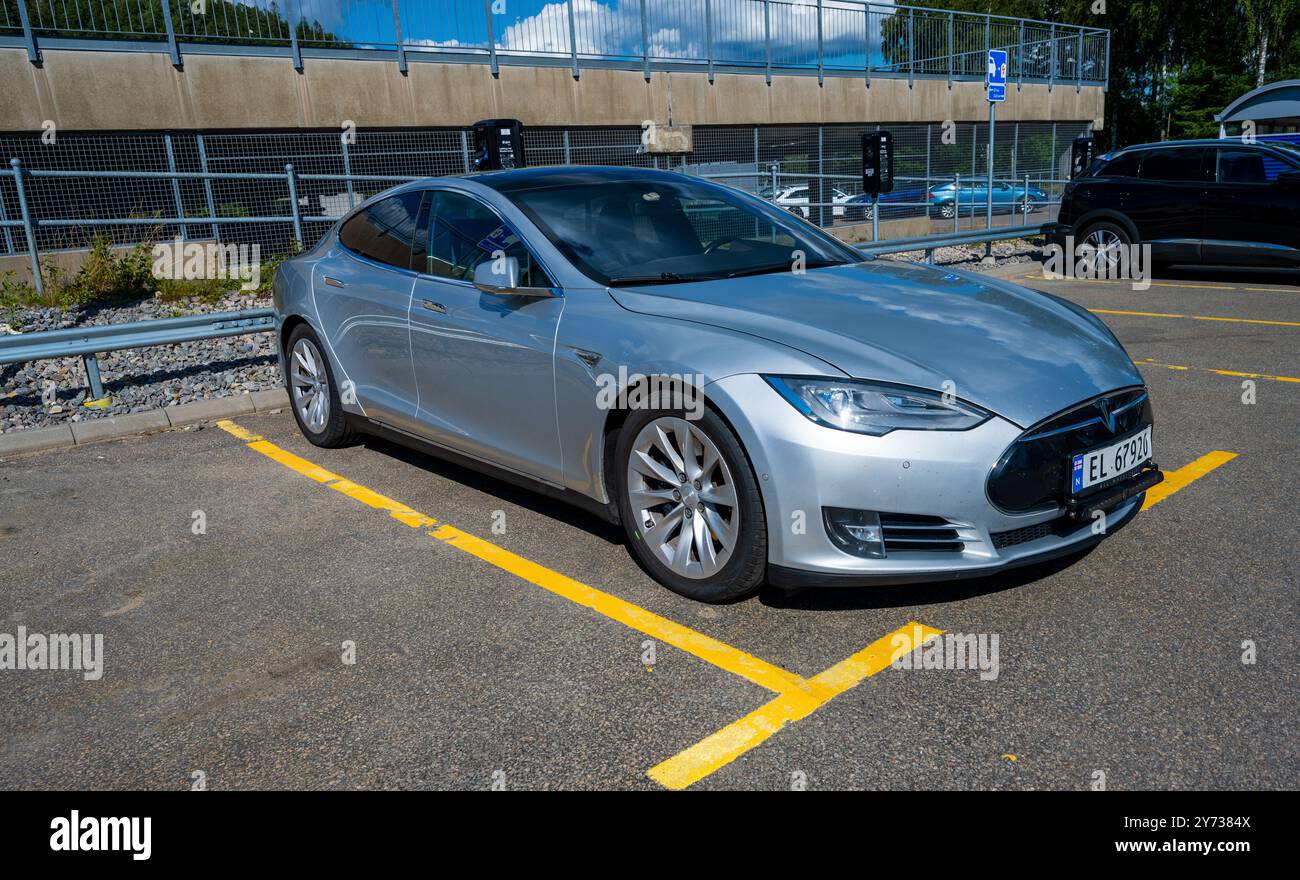 Ullared, Sweden - July 30 2022: Silver 2015 Tesla Model S electric car ...
