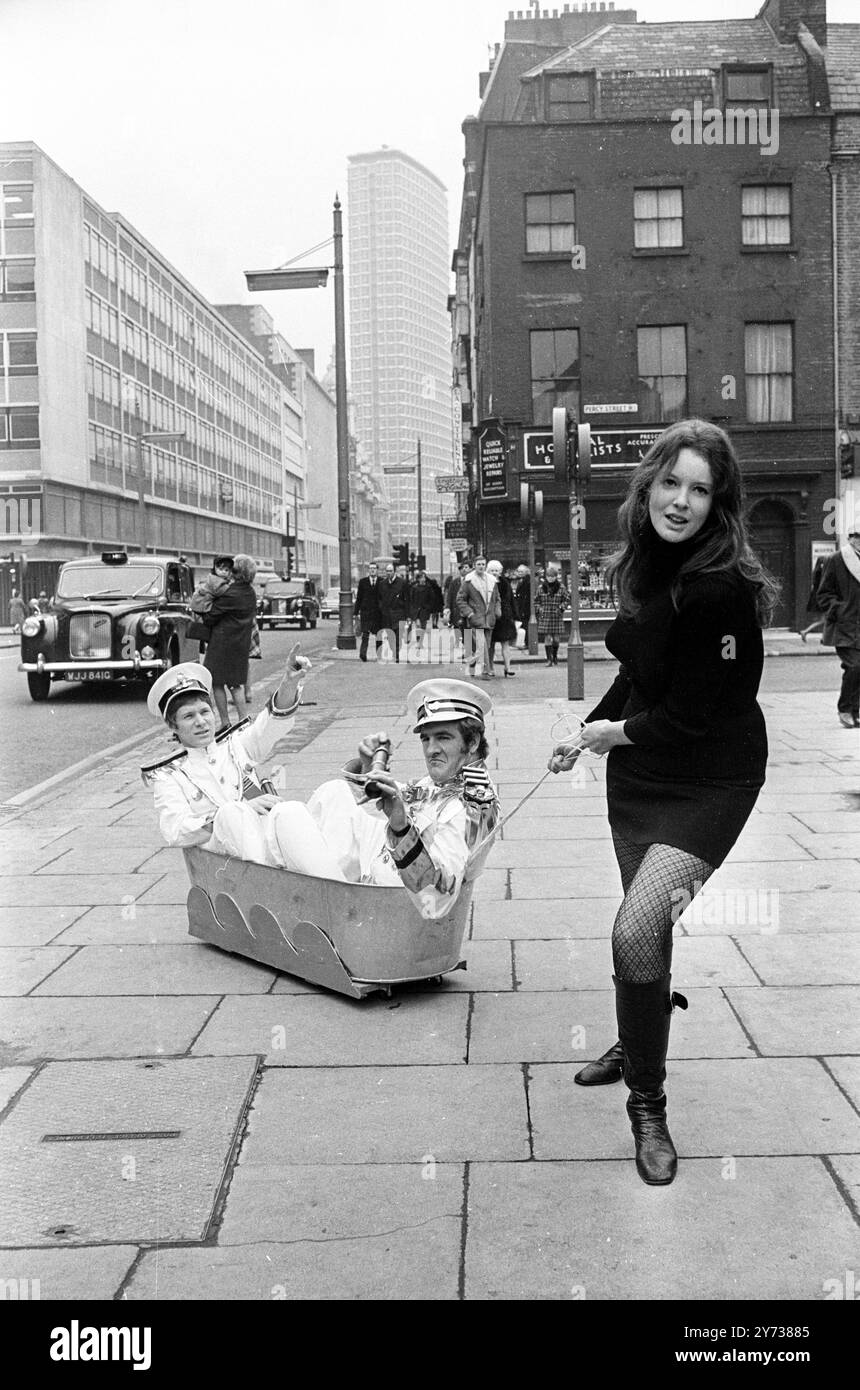 Sian Houston , 18 , stage assistant at the Open Space Theatre , pulls a ...